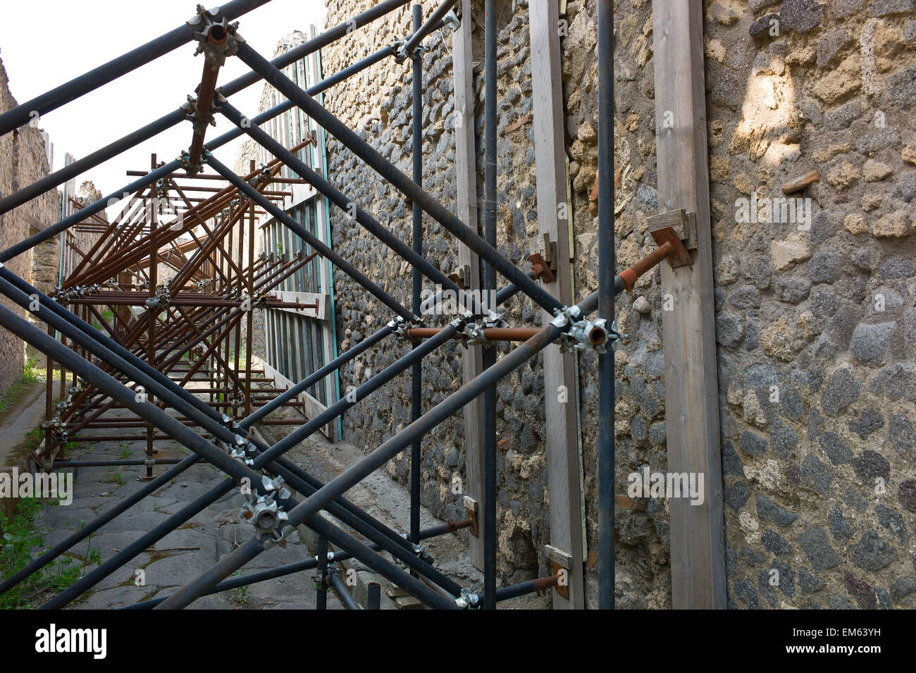 Scaffolding and props supporting building walls at the archaeological ...