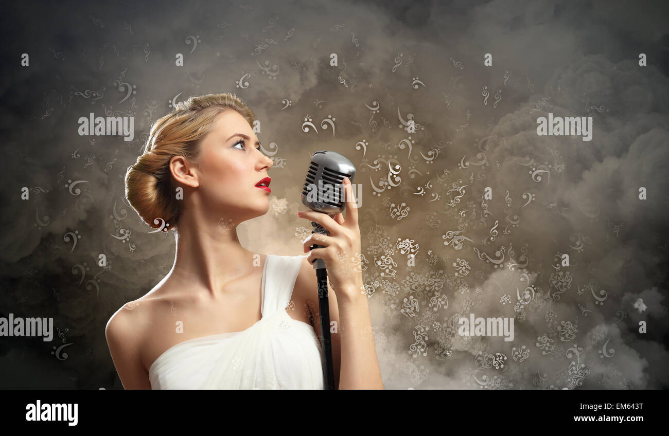 Female blonde singer Stock Photo - Alamy