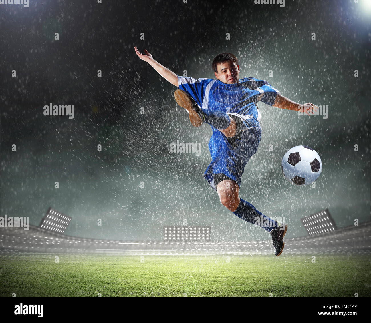 Football player stadium hitting ball hi-res stock photography and ...