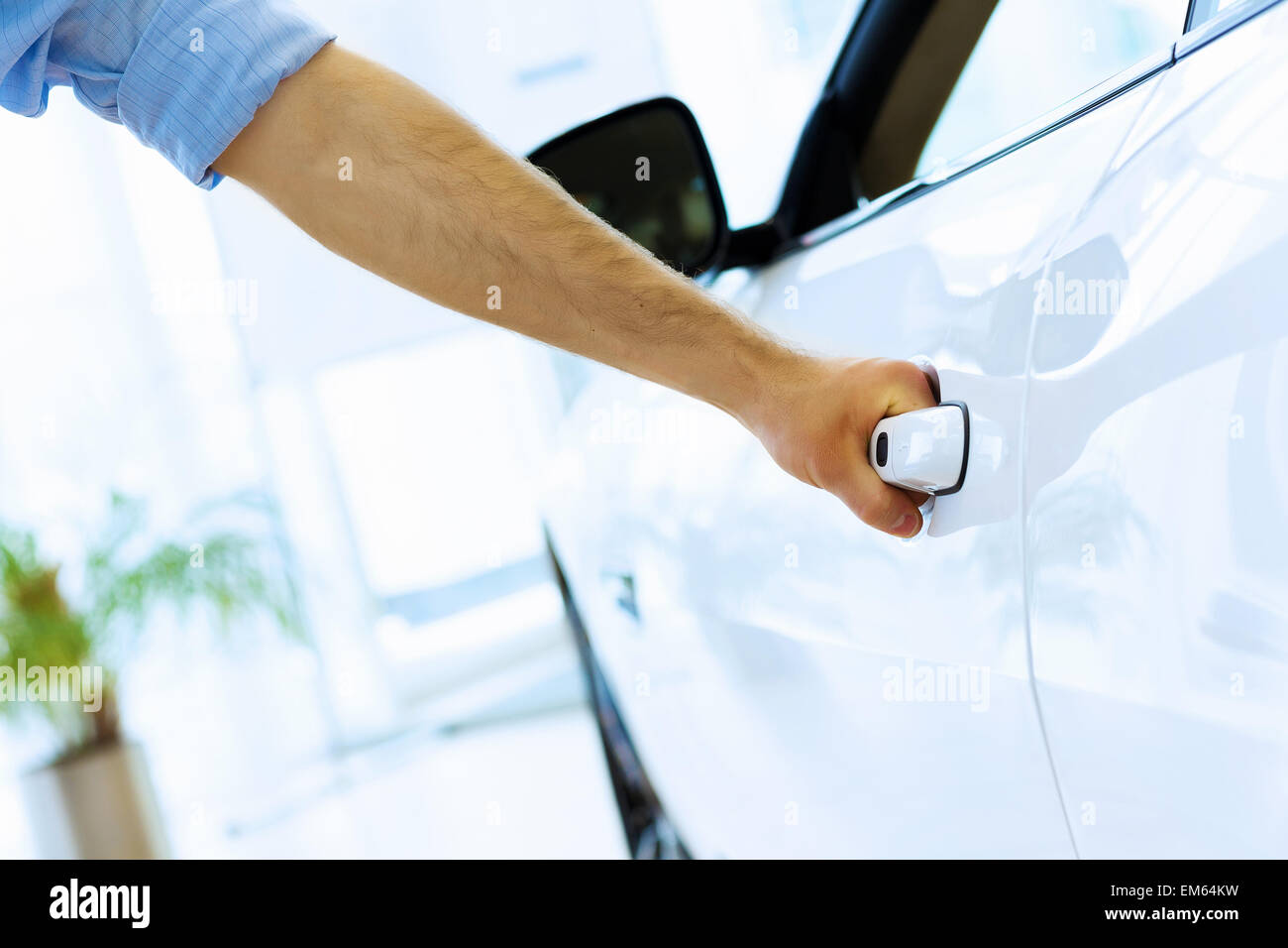 Man opening car Stock Photo - Alamy