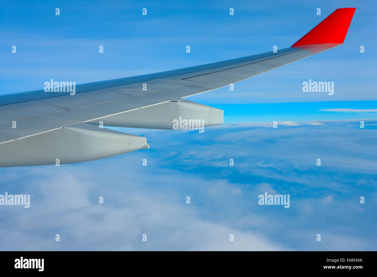 Air travel over the ocean of clouds Stock Photo - Alamy