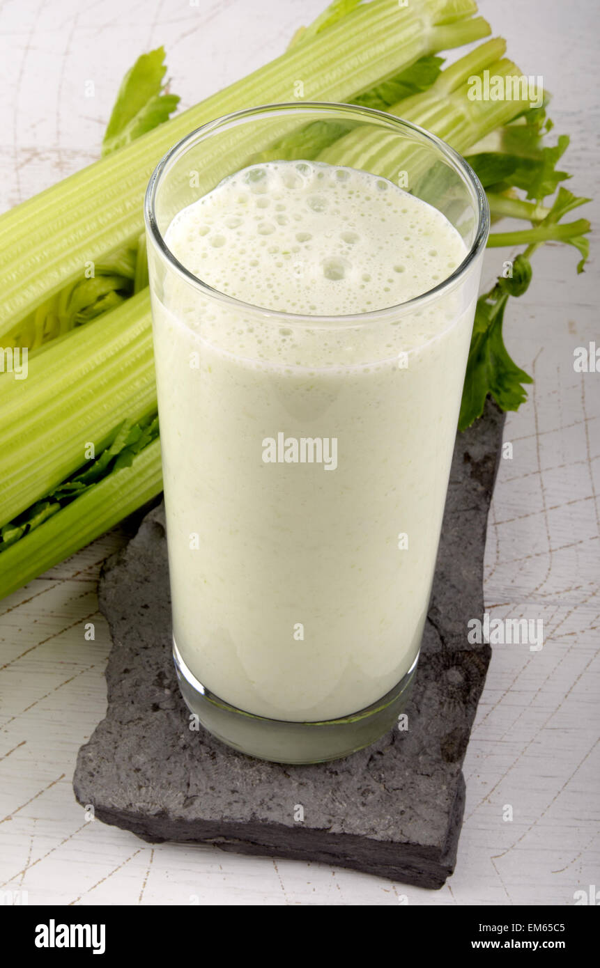 healthy celery smoothie in a glass Stock Photo - Alamy