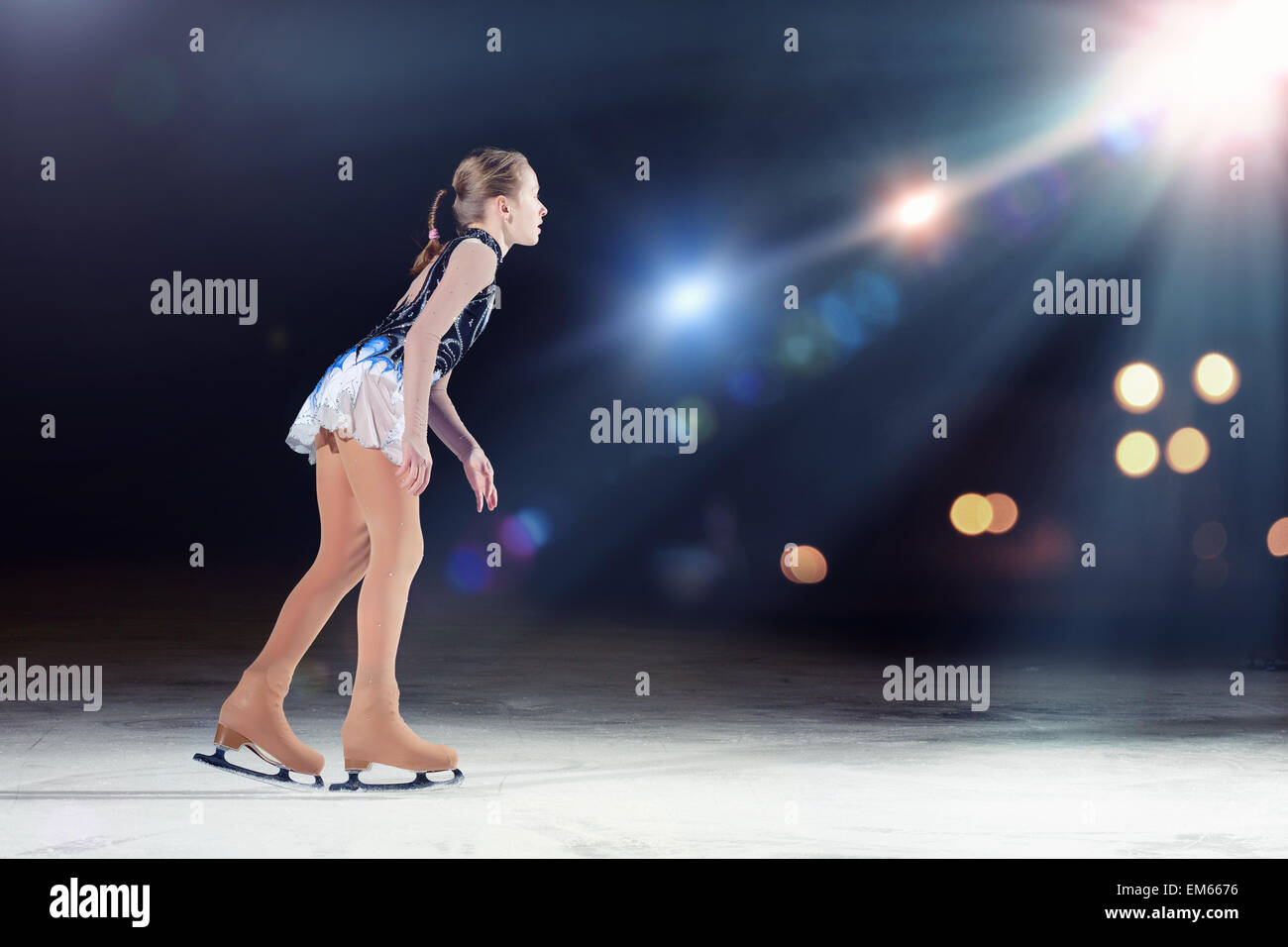 Little girl figure skating Stock Photo - Alamy