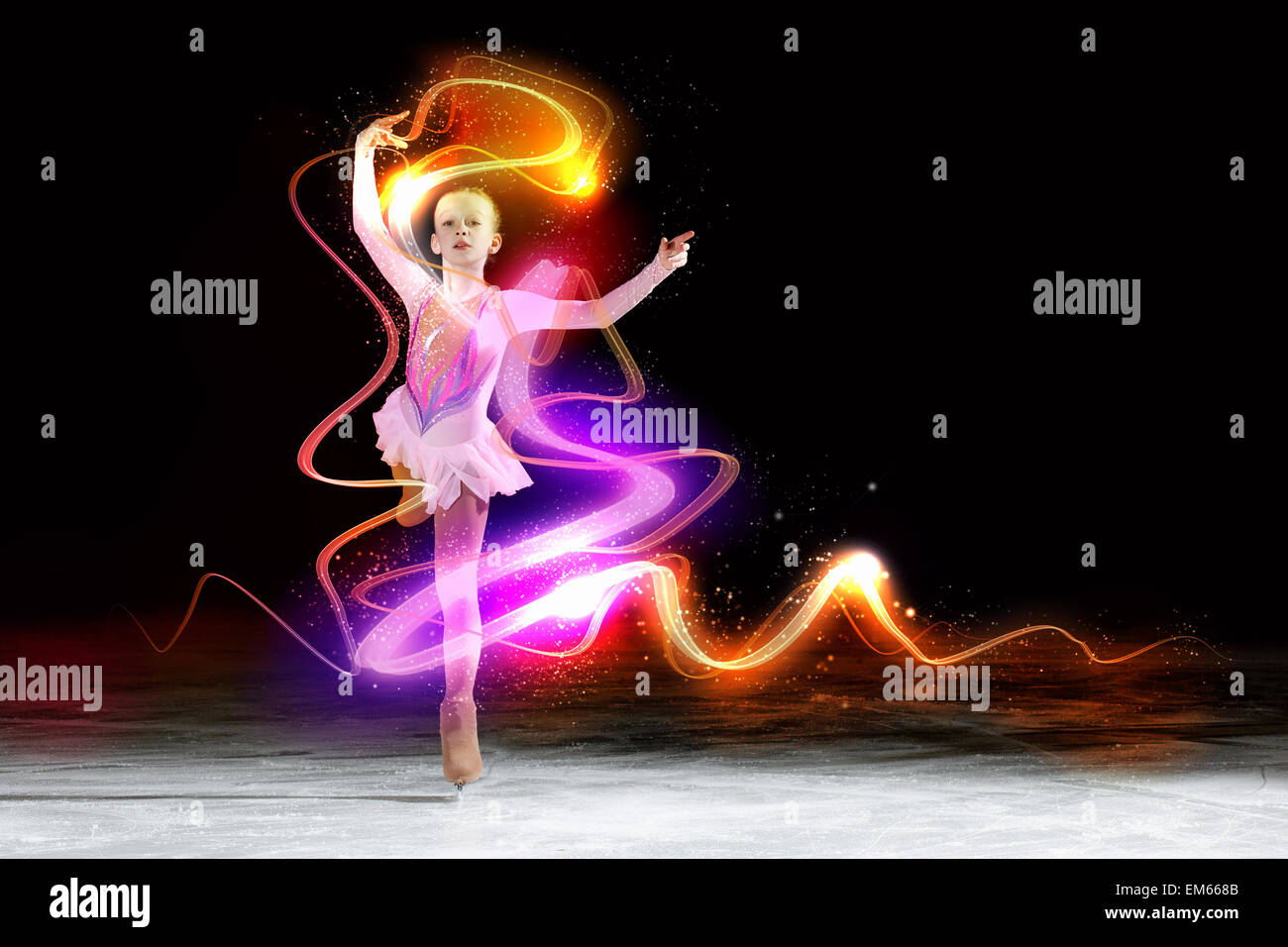 Little girl figure skating Stock Photo - Alamy