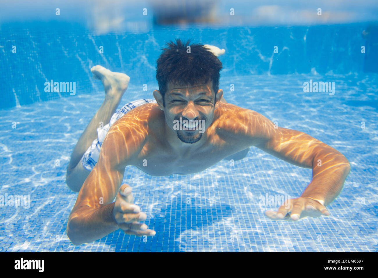 Smiling underwater hi-res stock photography and images - Alamy