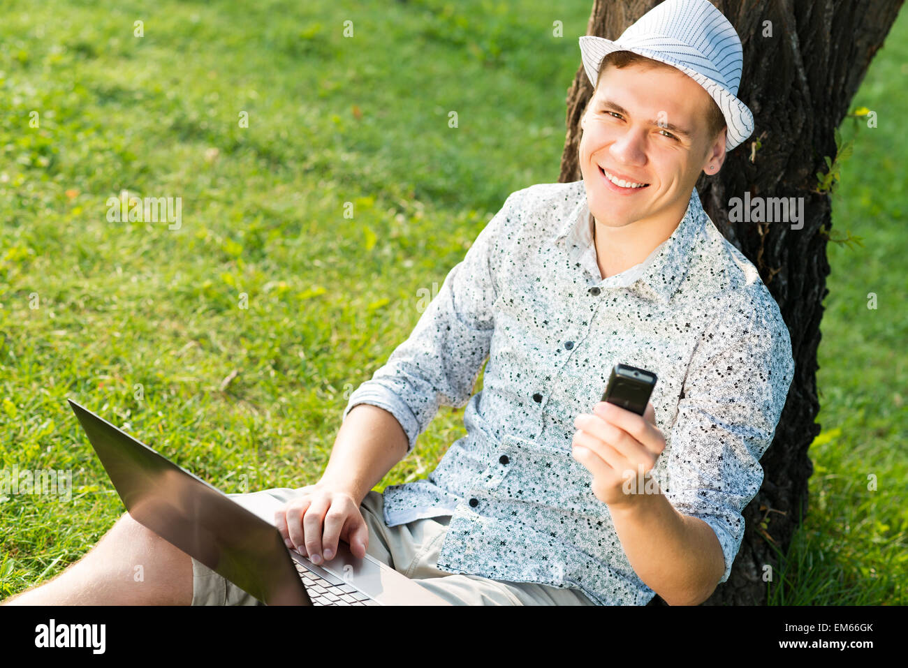 young man with a cell phone Stock Photo - Alamy