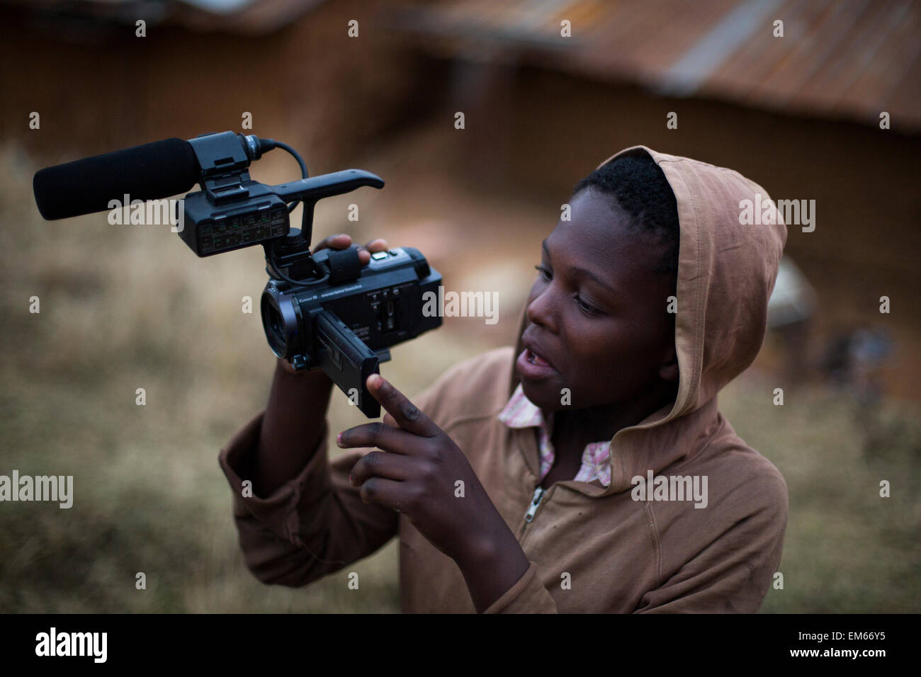 A kid plays with a video camera for the first time Stock Photo - Alamy