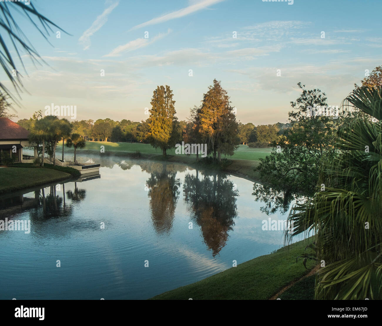 Sunrise on a golf course Stock Photo - Alamy