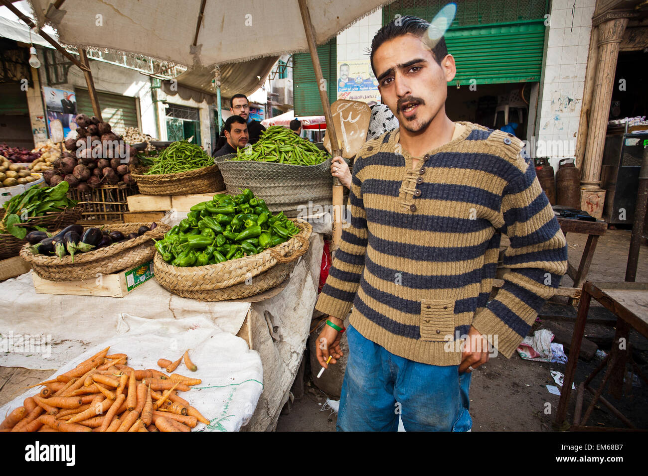 Salesman at the market Stock Photo - Alamy