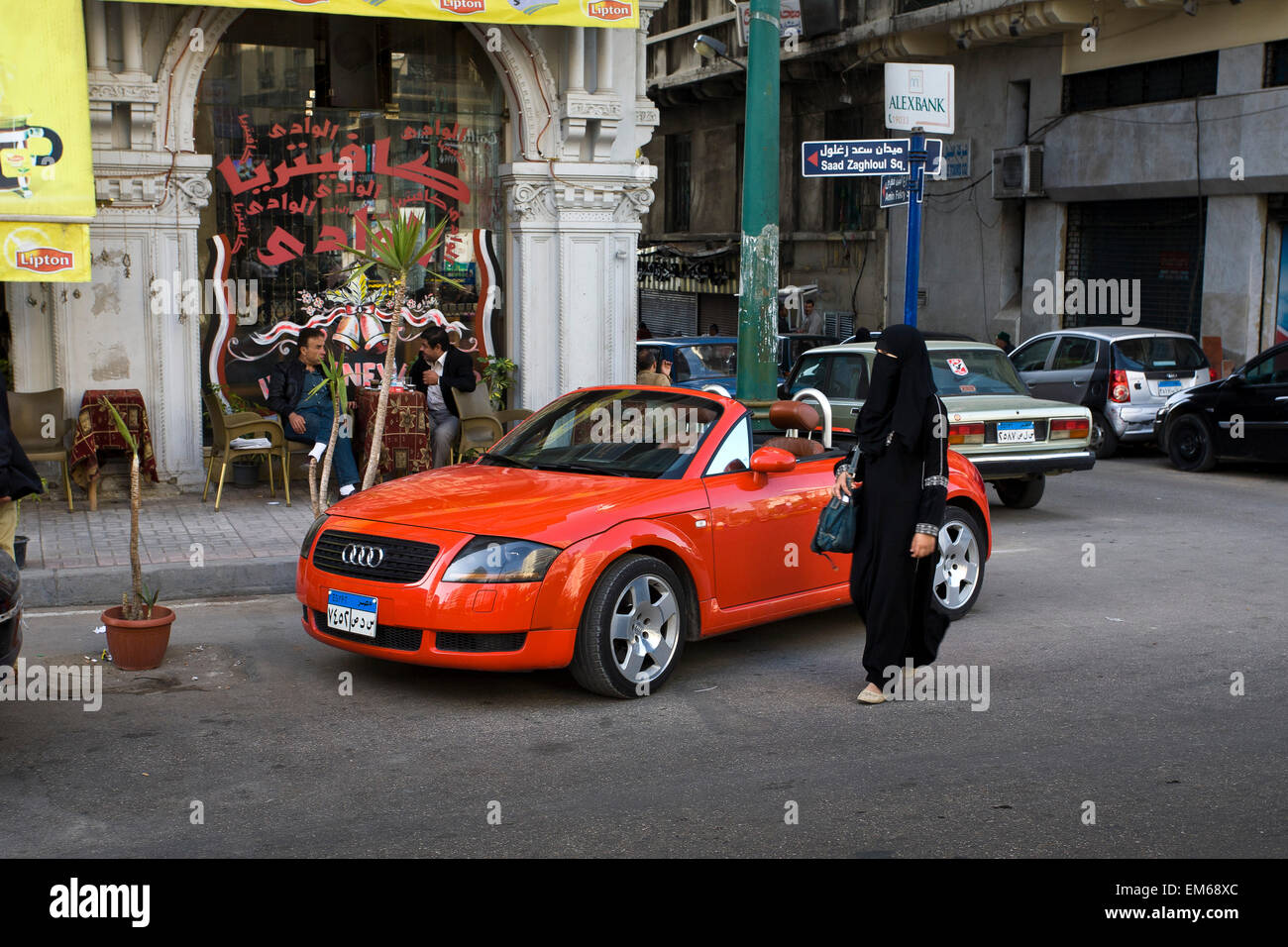 Woman and fast car Stock Photo - Alamy