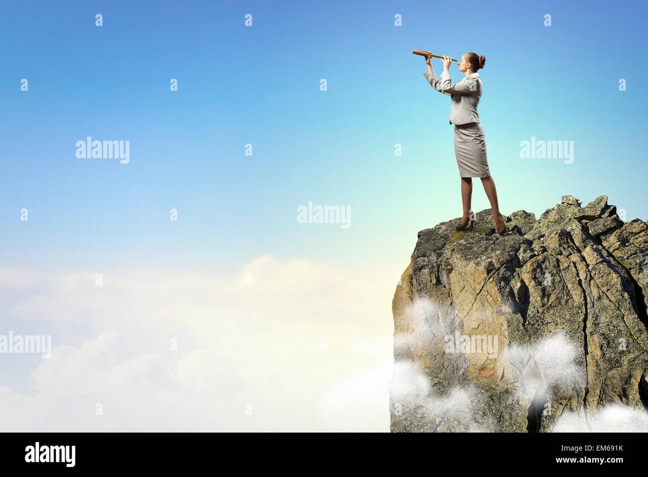 Business woman with telescope Stock Photo - Alamy