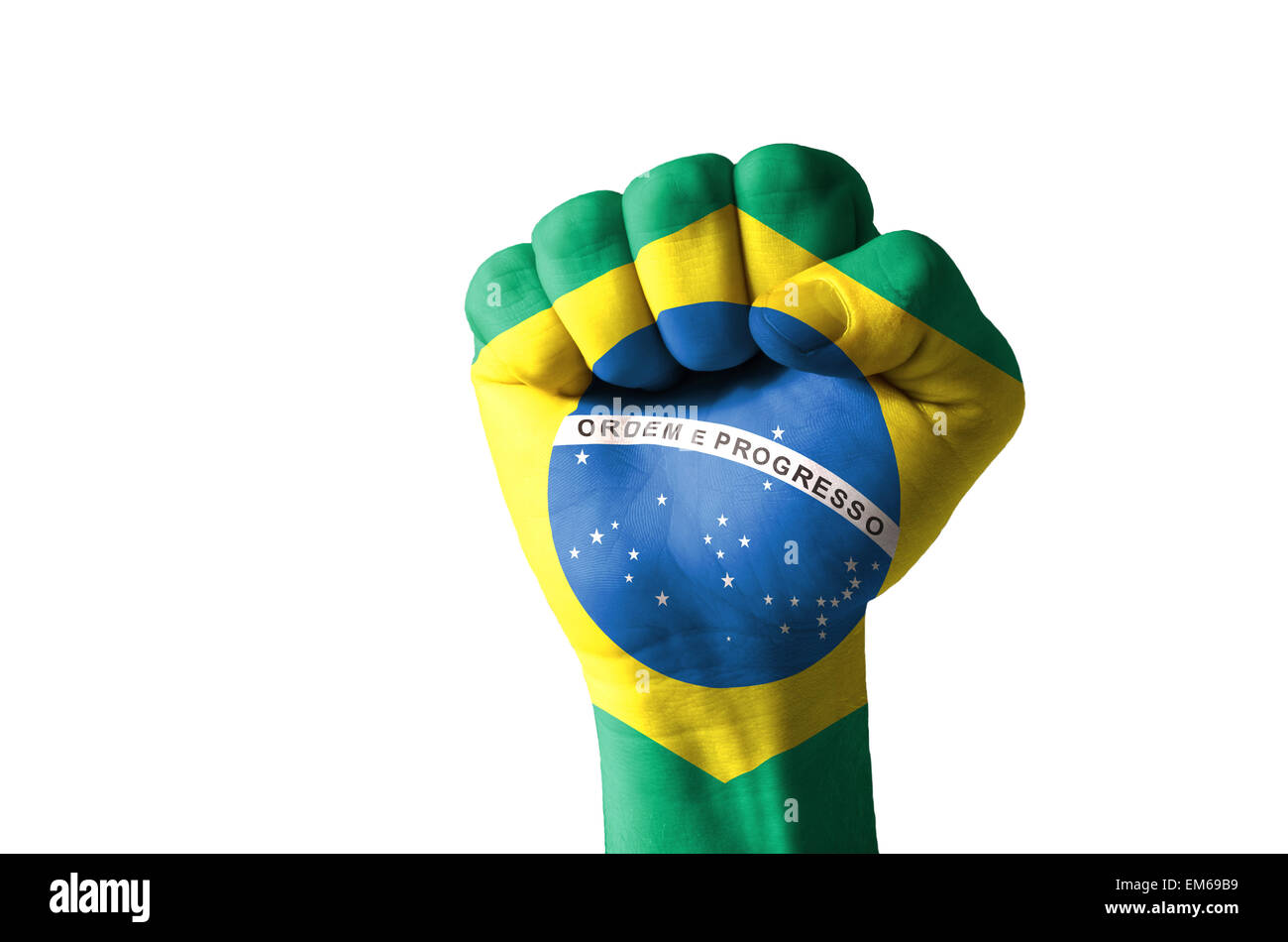 Low key picture of a fist painted in colors of brazil flag Stock Photo ...