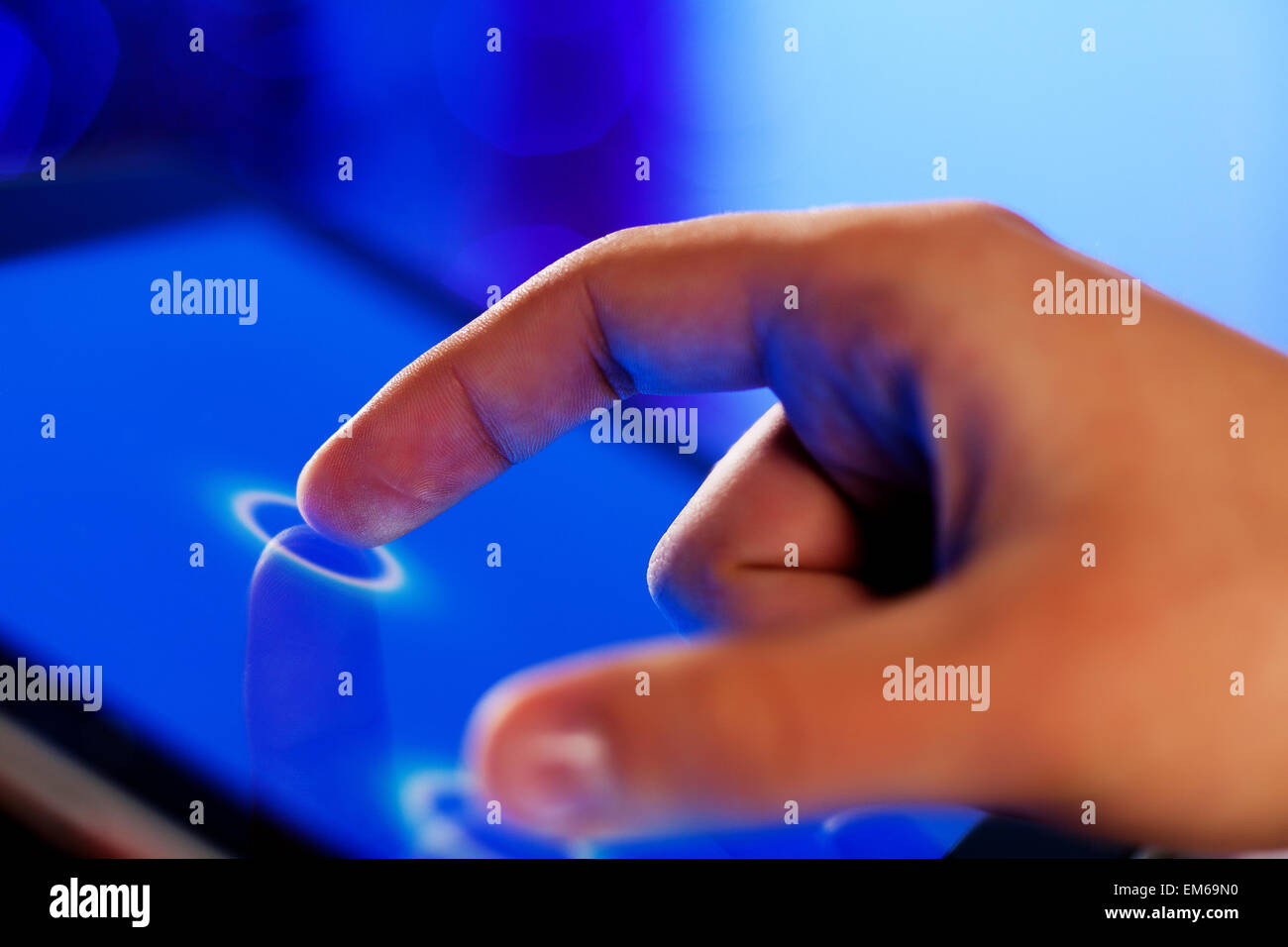 Finger touching screen Stock Photo - Alamy