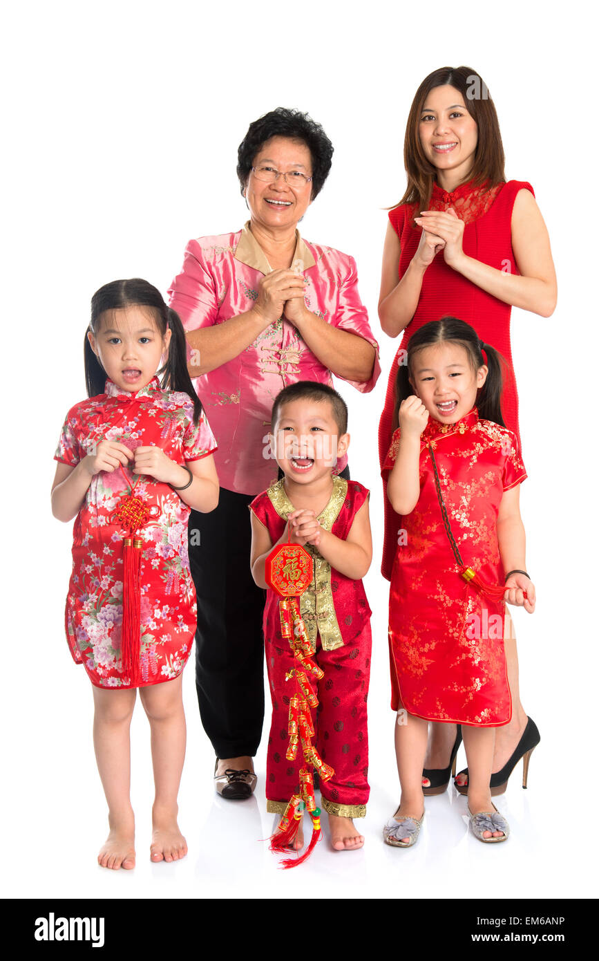 Asian Chinese family greeting on Chinese New Year Stock Photo - Alamy