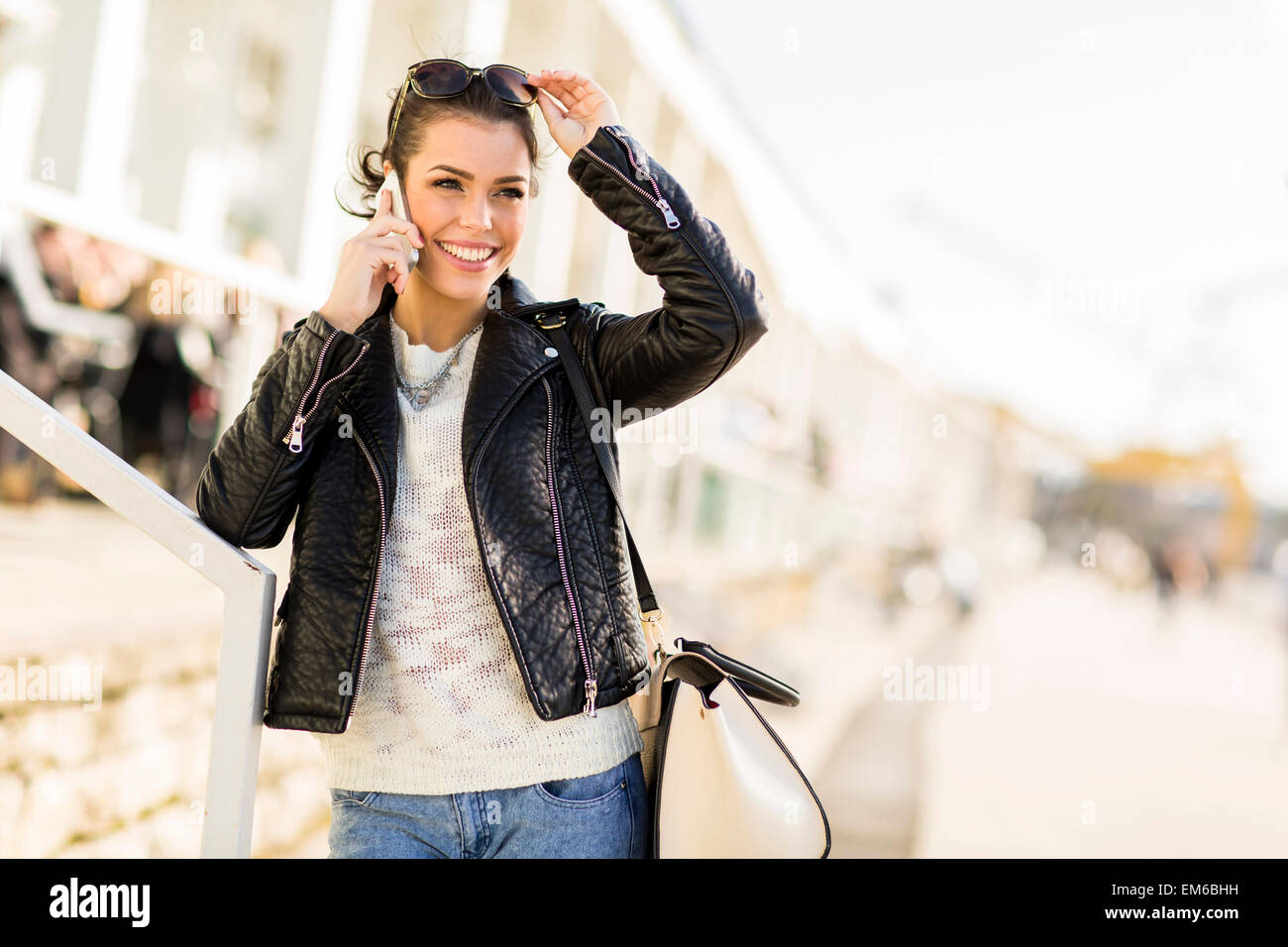 Young woman with mobile phone Stock Photo - Alamy