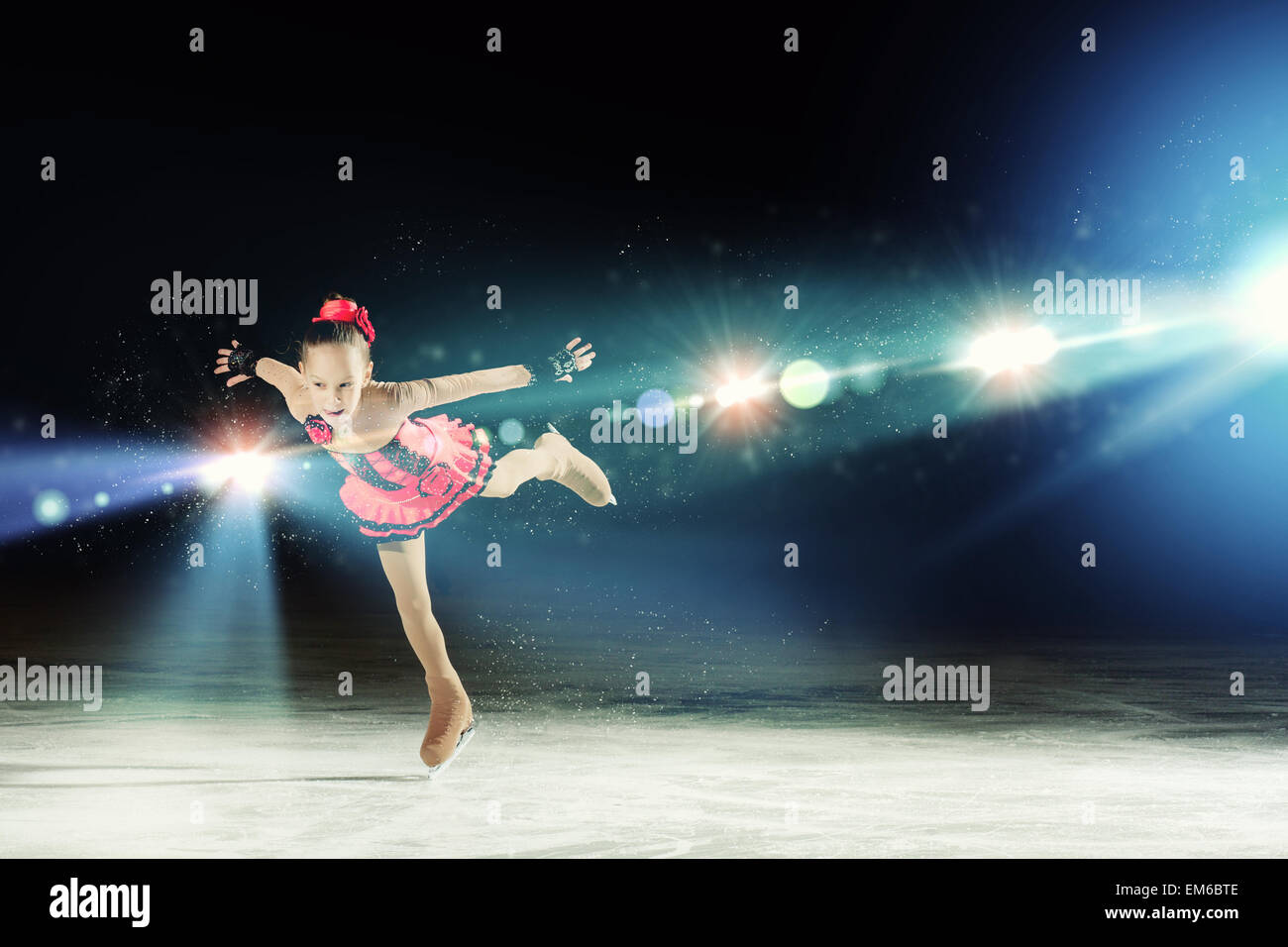 Little girl figure skating Stock Photo - Alamy