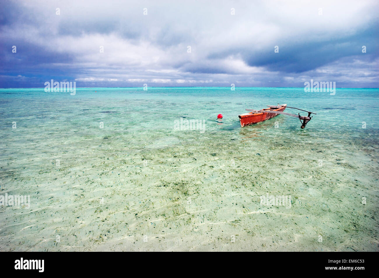French Polynesia, Tahiti, Bora Bora, Red Outrigger Canoe In Calm ...