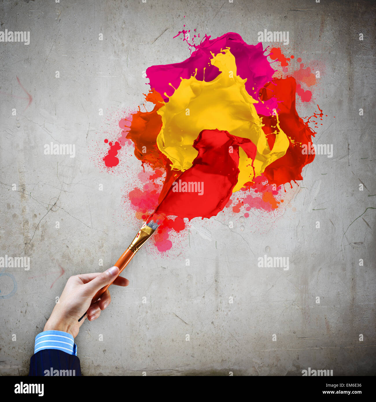 Human hand holding paint brush Stock Photo - Alamy
