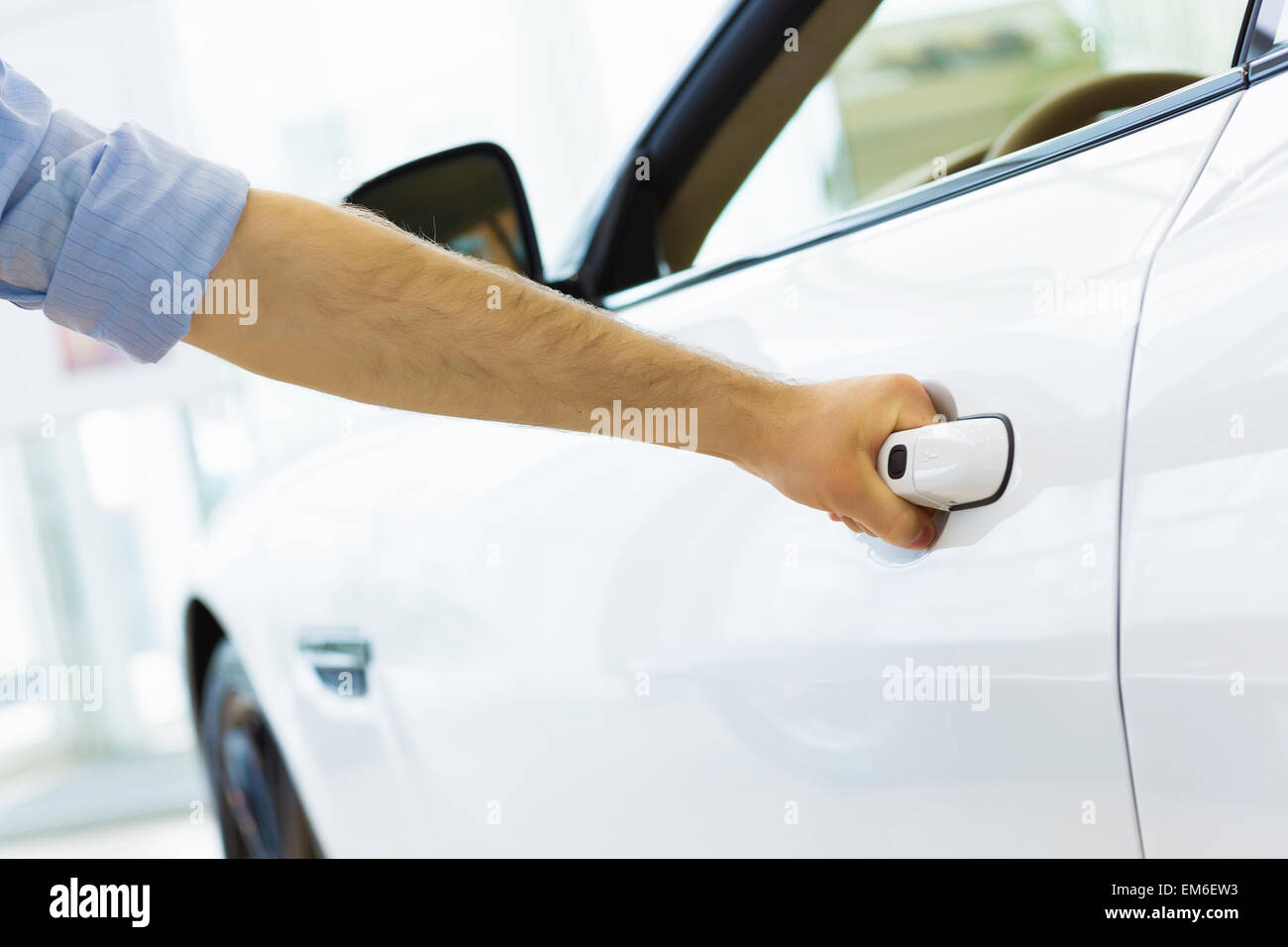 Man opening car Stock Photo - Alamy