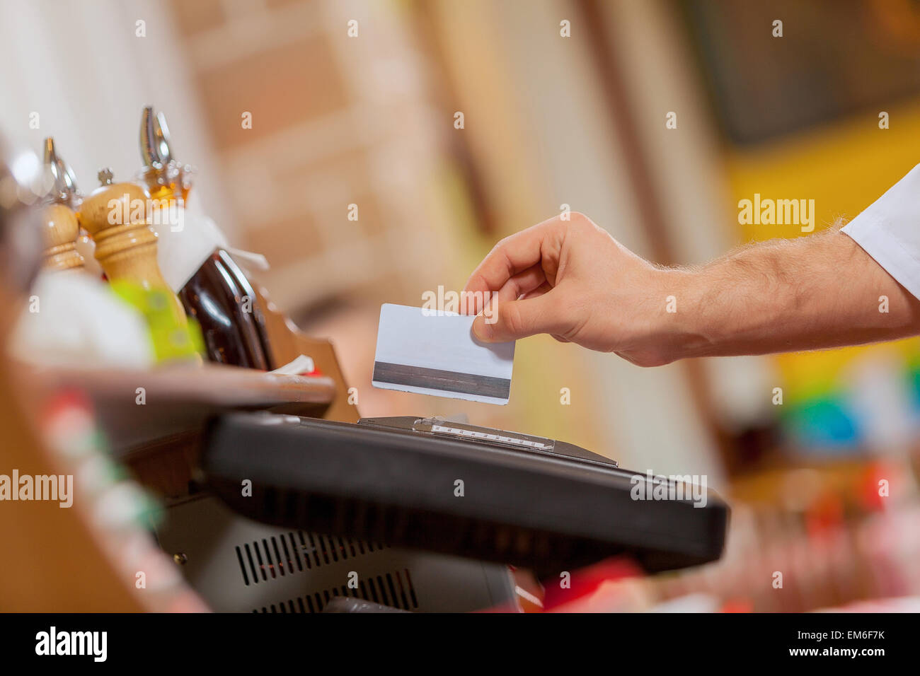 Close-up of cashier hands Stock Photo - Alamy