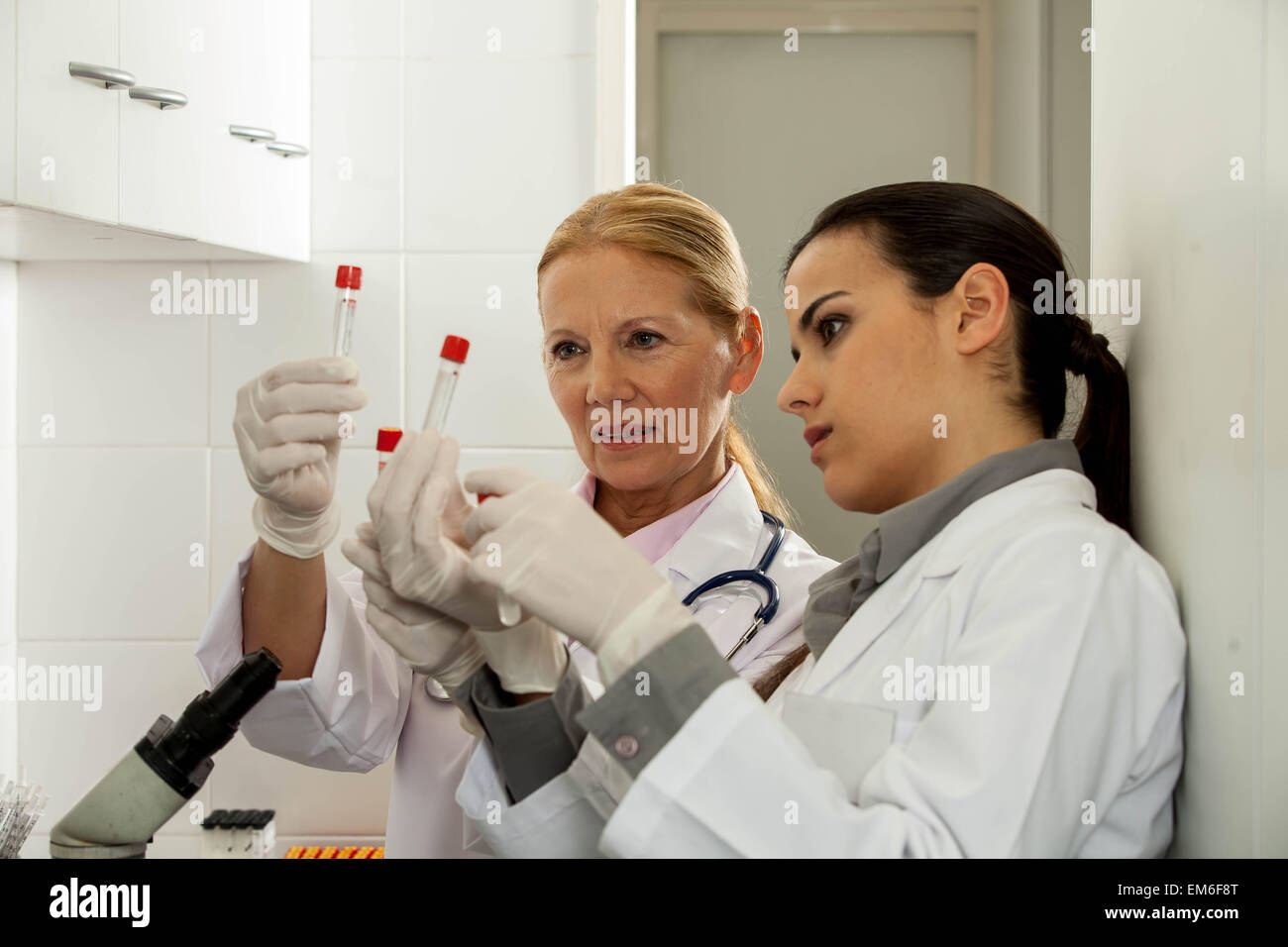Two scientist women in the laboratory Stock Photo - Alamy