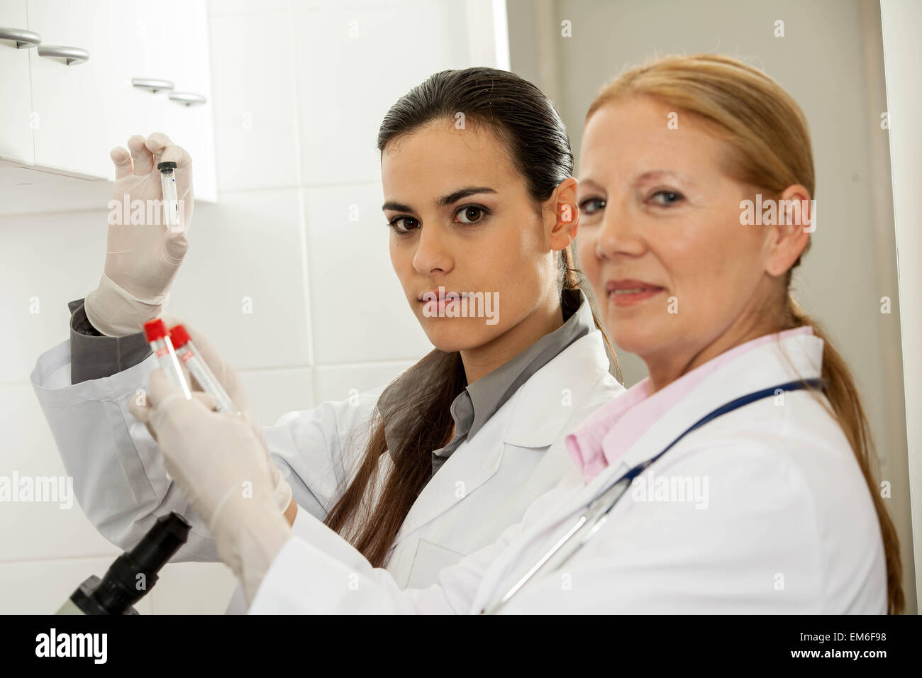 Two scientist women in the laboratory Stock Photo - Alamy