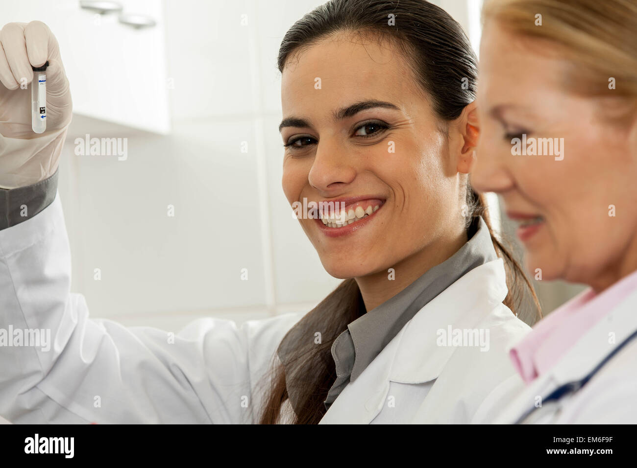 Two scientist women in the laboratory Stock Photo - Alamy