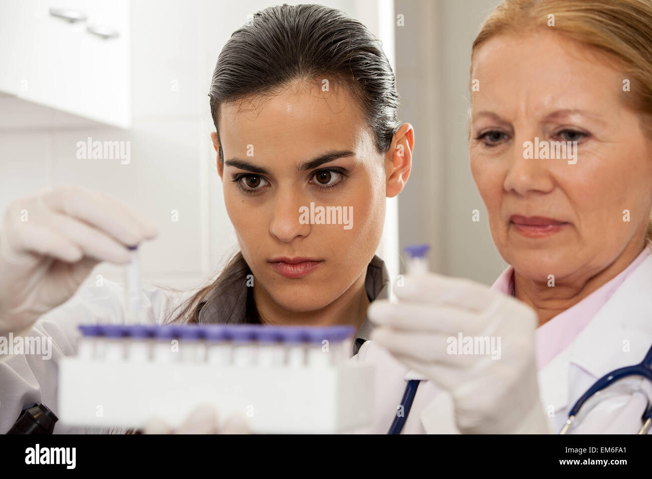 Two scientist women in the laboratory Stock Photo - Alamy