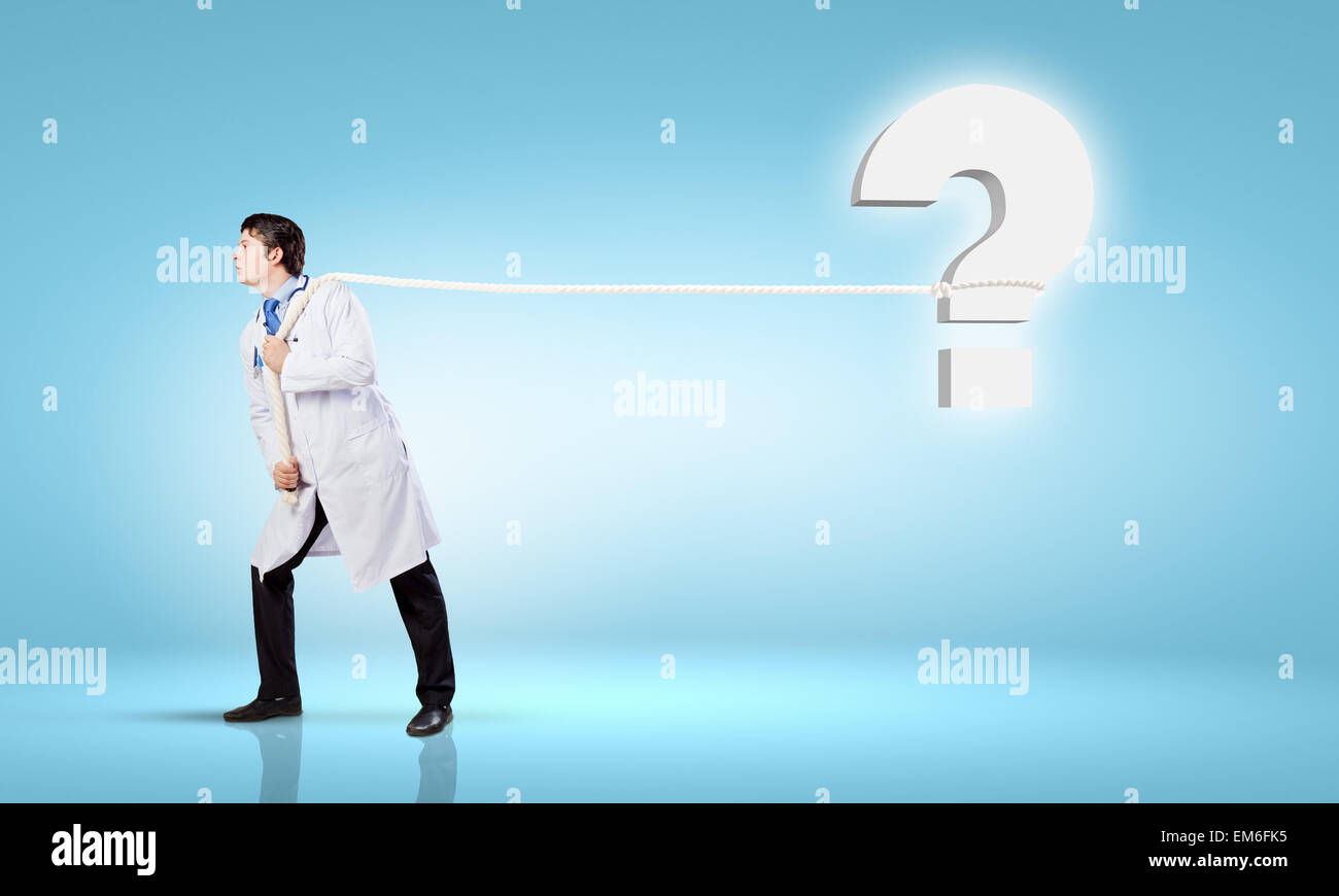 Doctor questioning young male hi-res stock photography and images - Alamy