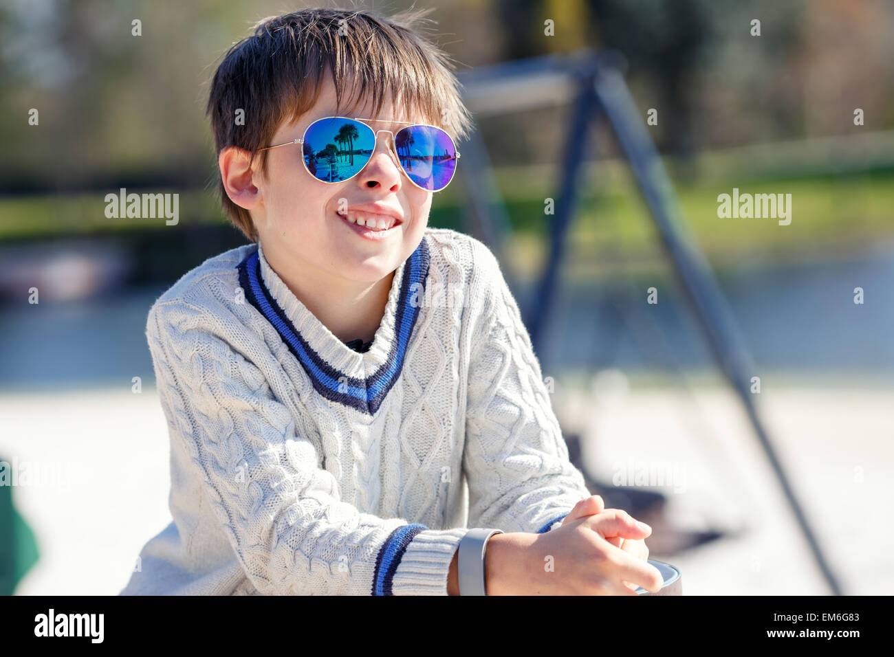Cheerful little boy having relax outdoors Stock Photo - Alamy