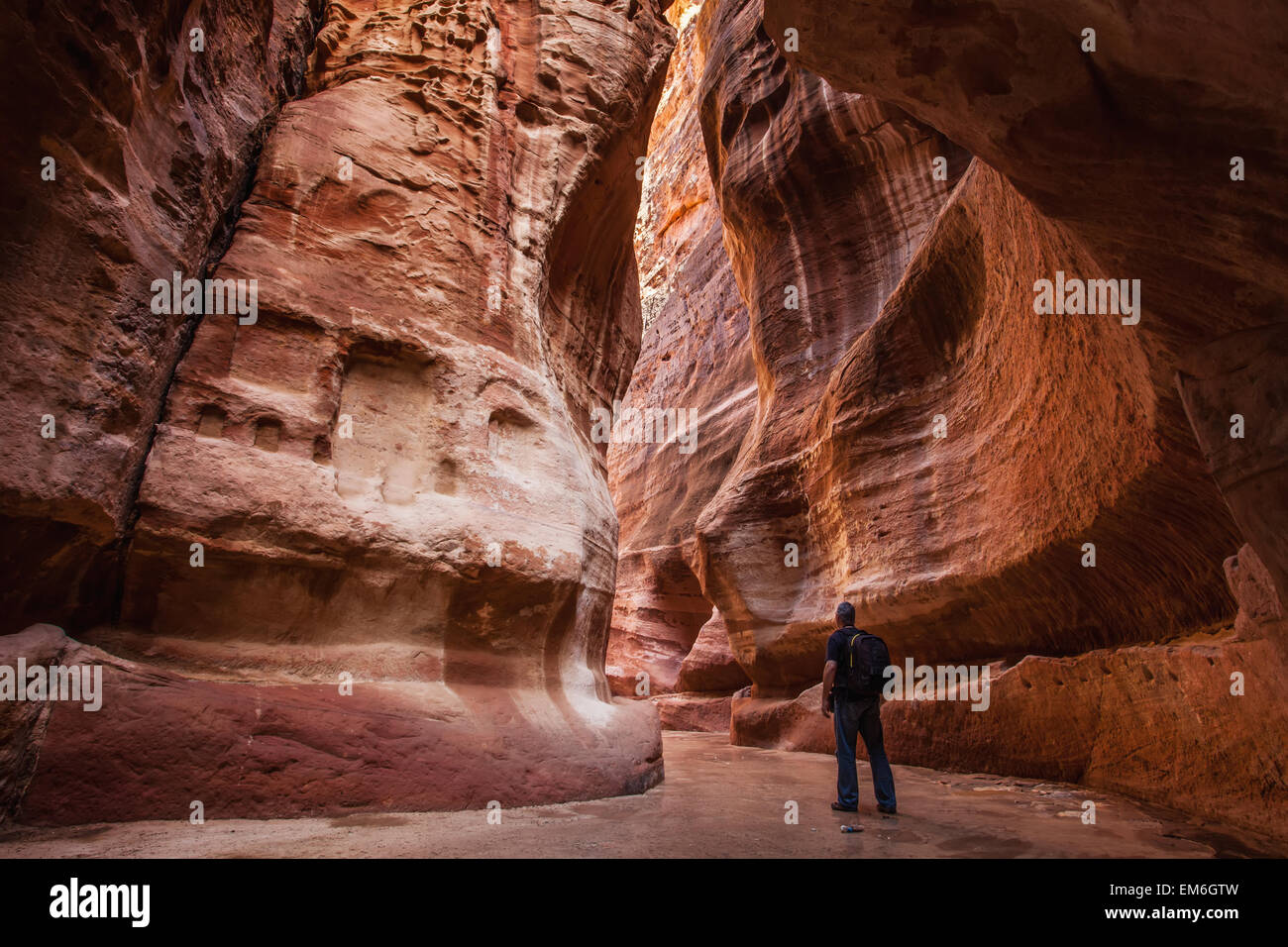 Jordan, Man looking at rock formations; Petra Stock Photo - Alamy