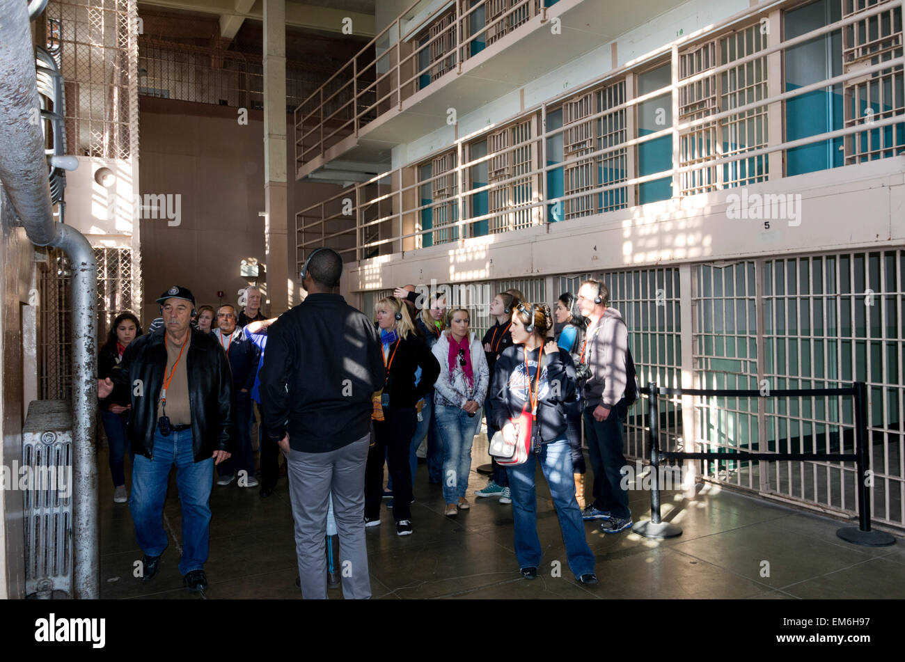 Alcatraz, tourist walk through the cell area, listening to tour ...