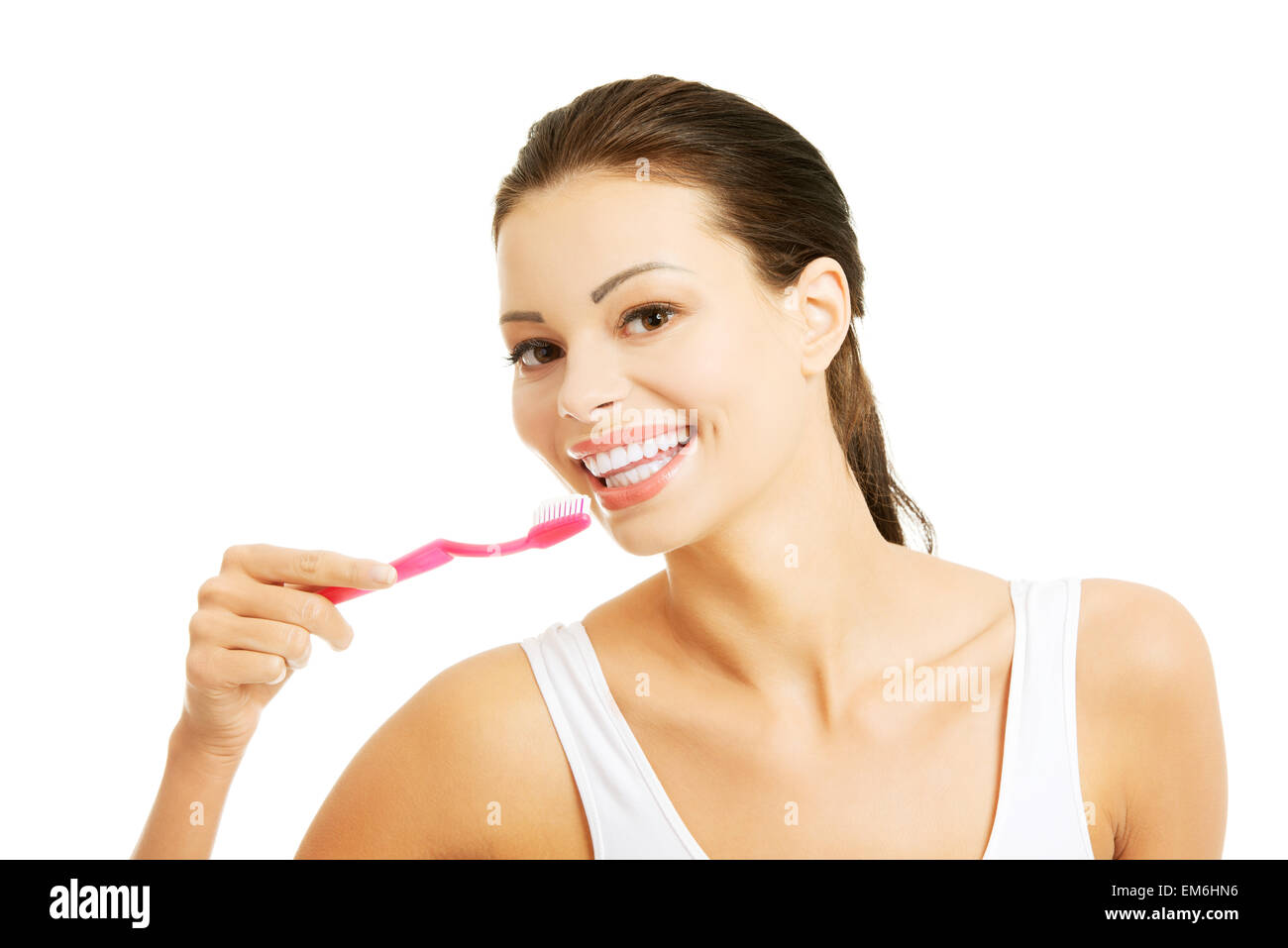 Young beautiful woman washing her teeth Stock Photo - Alamy
