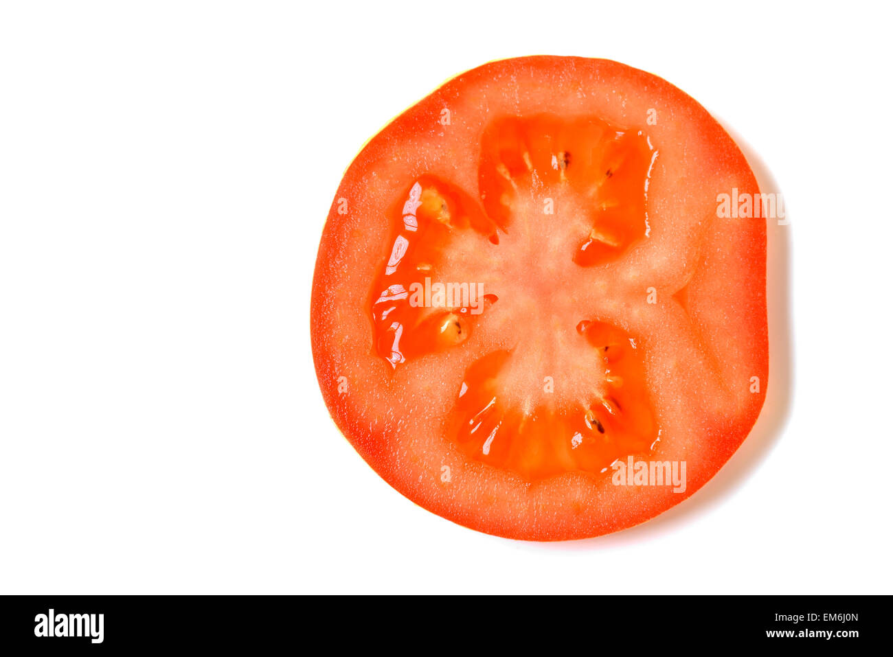 Isolated slice of tomato Stock Photo - Alamy