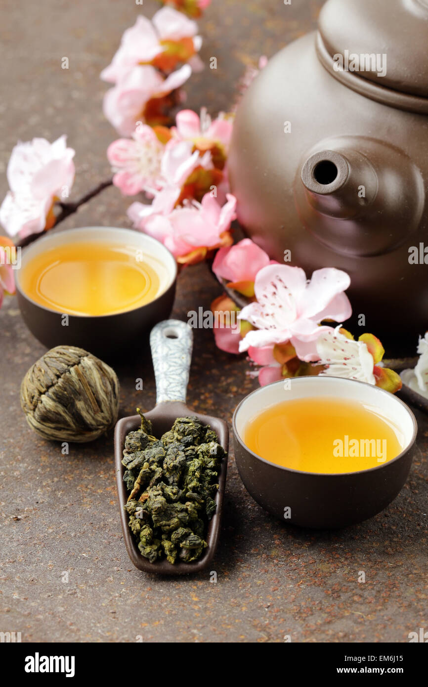 tea set (teapot, cups and different green tea Stock Photo - Alamy