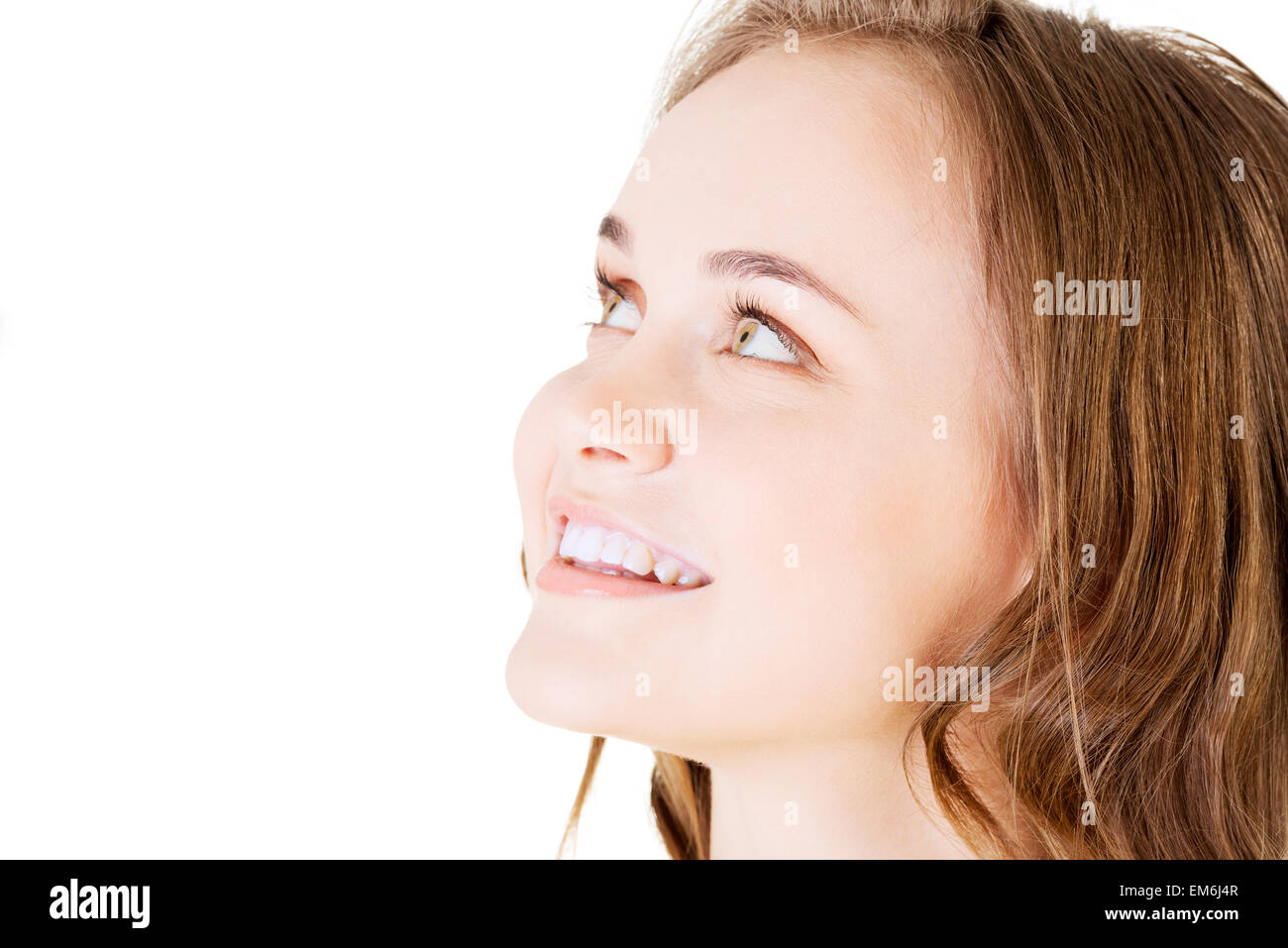 Young woman looking away Stock Photo - Alamy