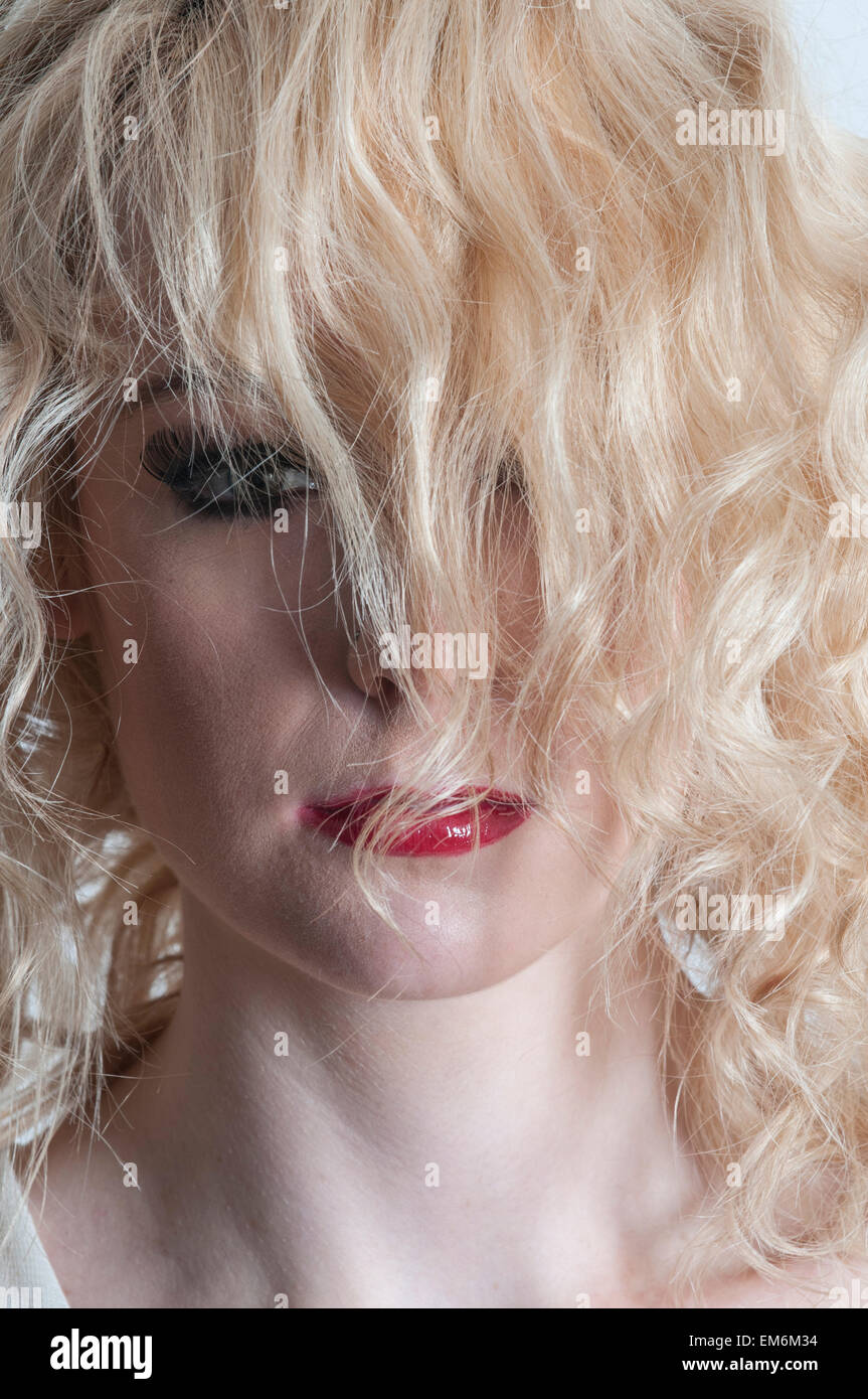 Young woman hair covering face Stock Photo - Alamy