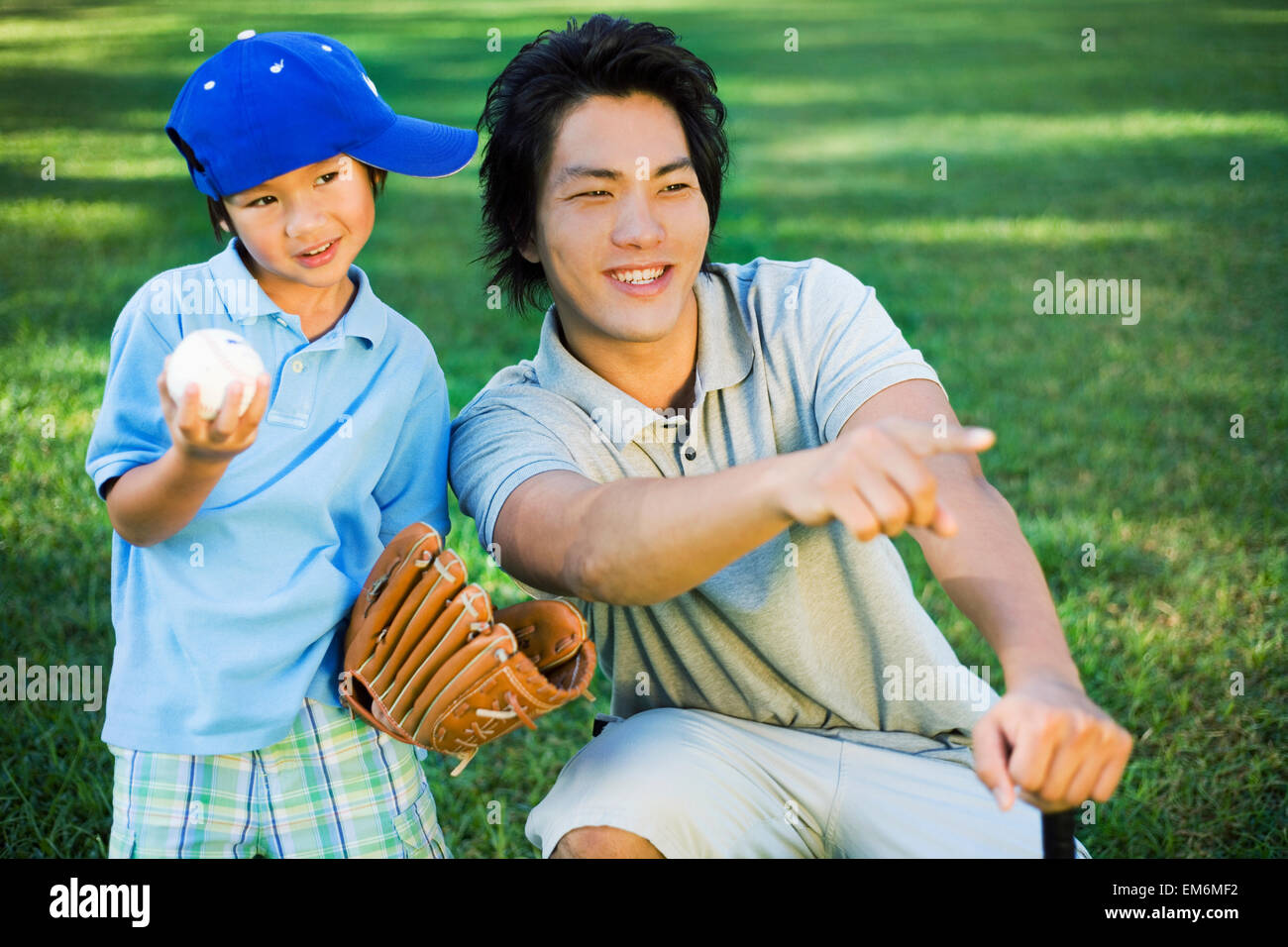 Young Japanese Father And Child Playing Baseball Stock Photo - Alamy