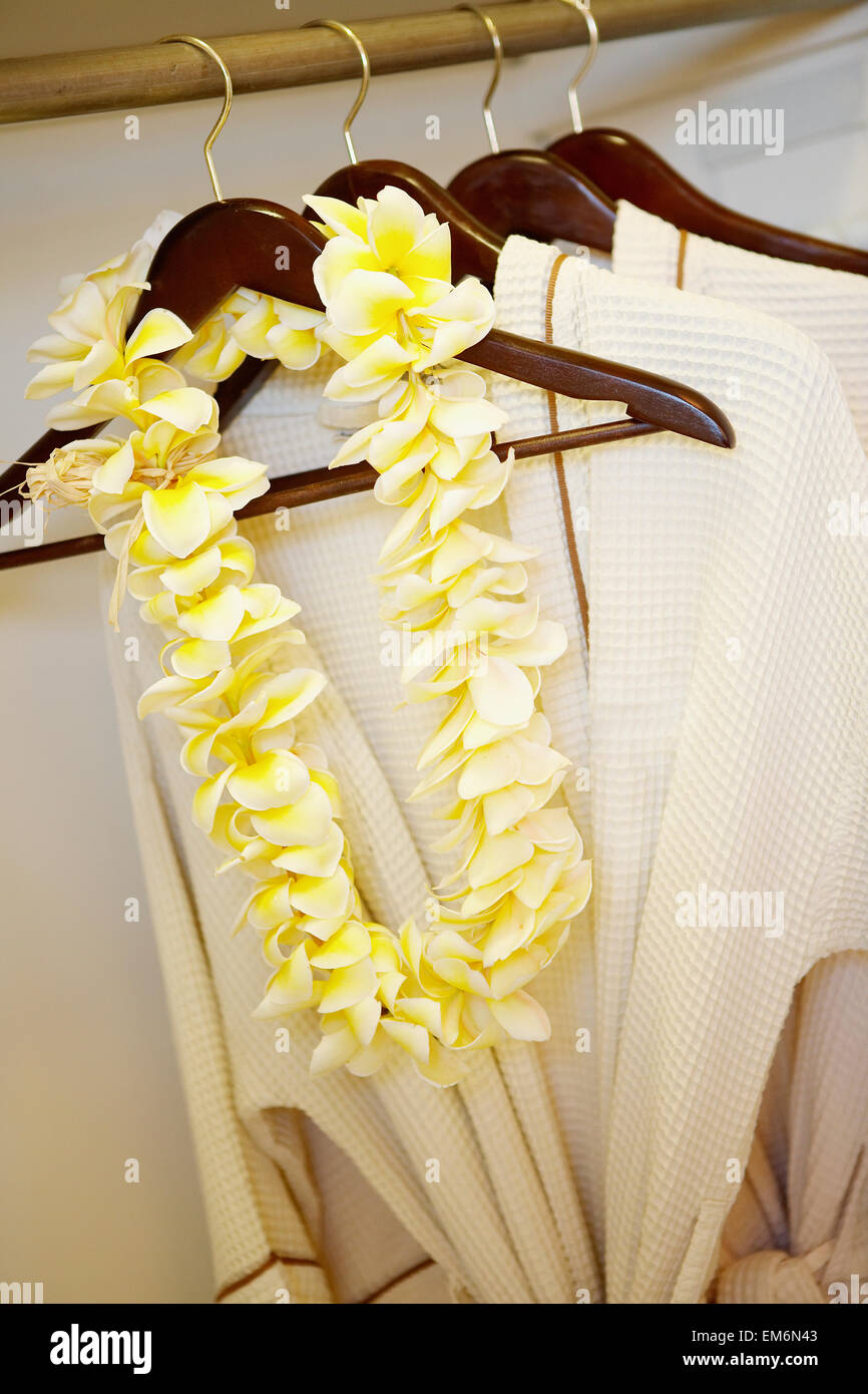 USA, Hawaii, Robes And Flower Lei Hanging In Hotel Closet; Kona Stock ...