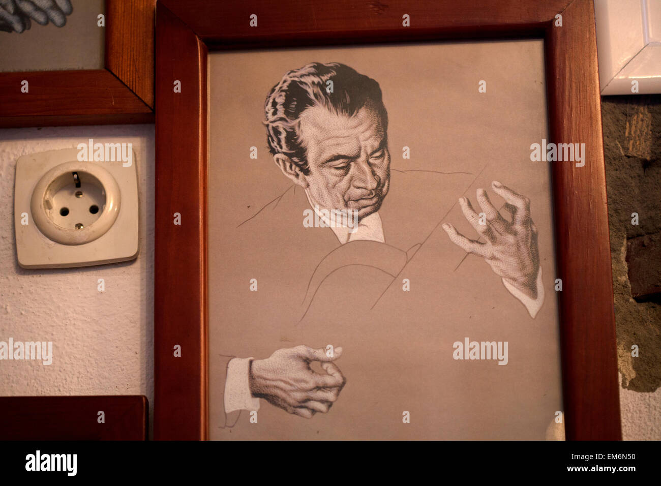 A painting of Manuel Serrapi ?Niño Ricardo? decorates the Pena Cultural ...