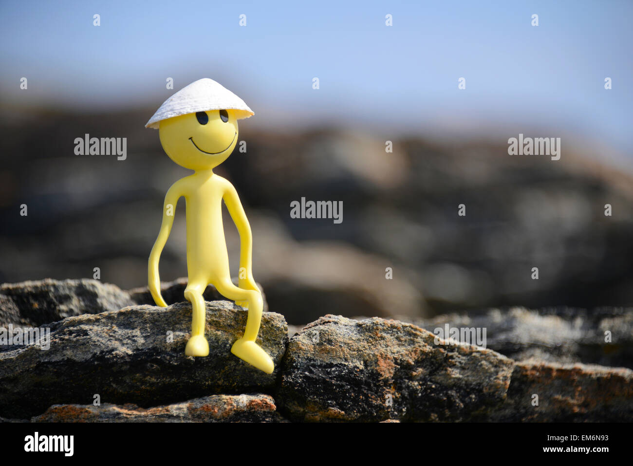 Yellow Smiley Man on holiday in the Outer Hebrides - Here he's sitting ...