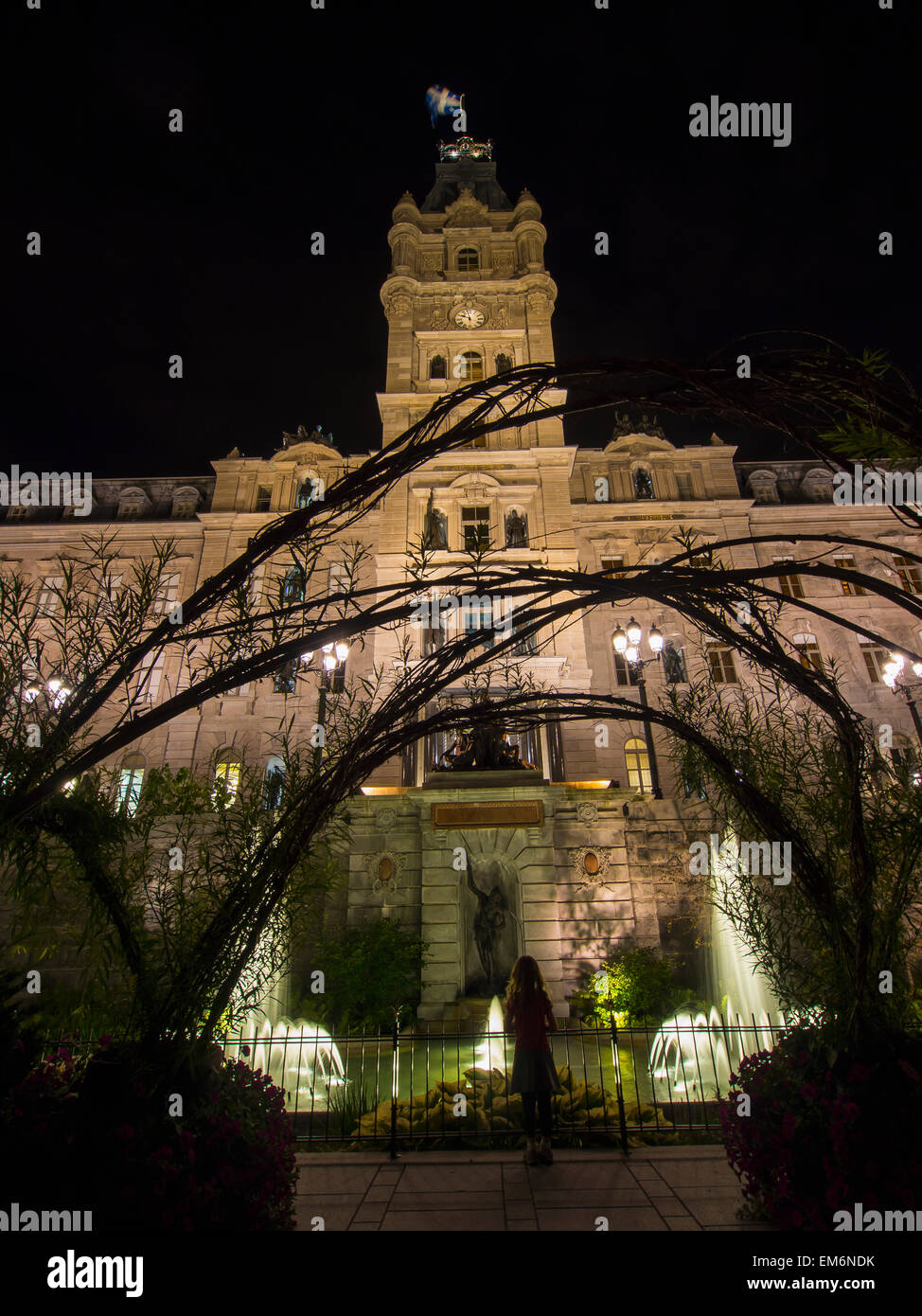 Quebec City's parliament building with water fountains illuminated at ...