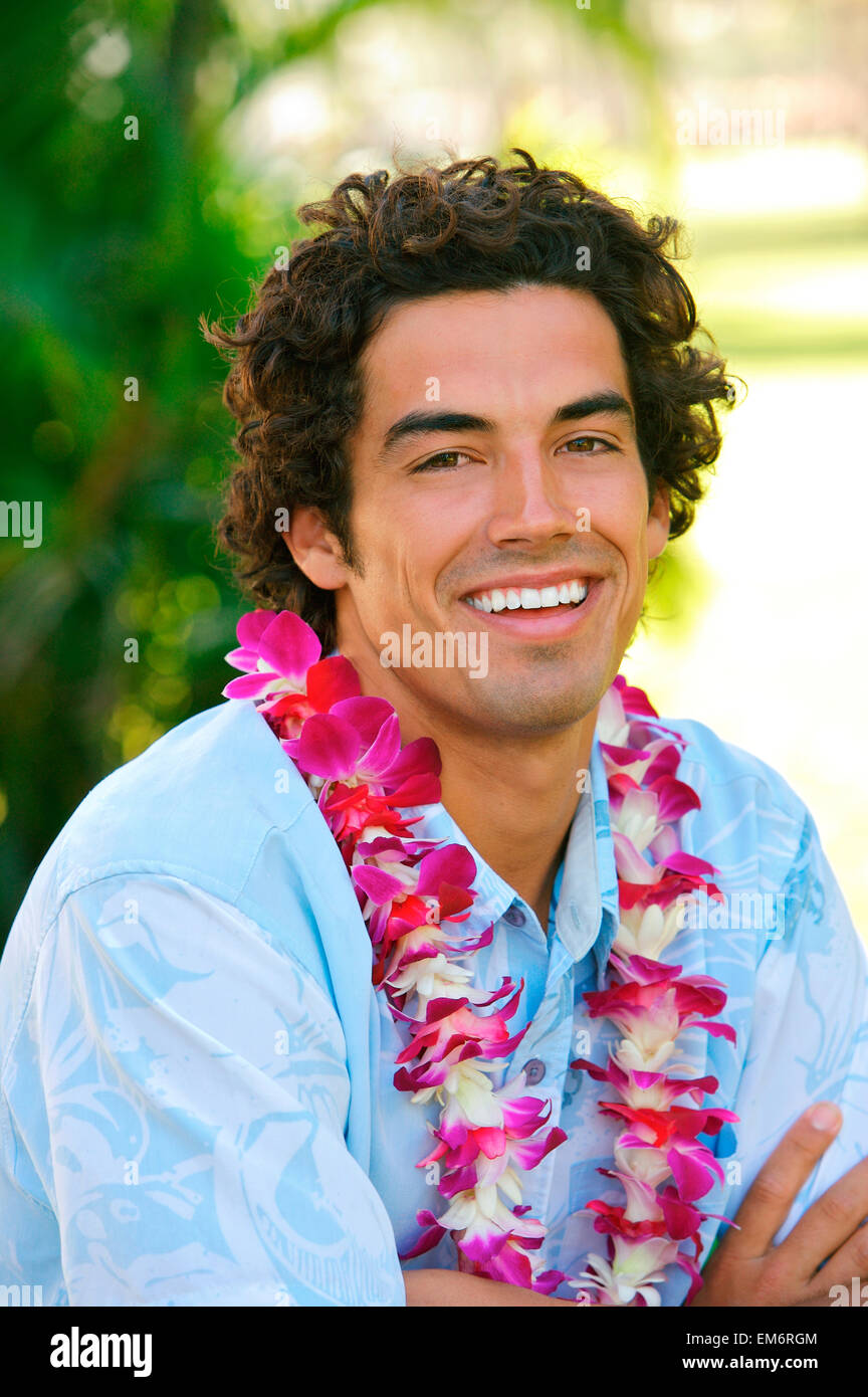 Hawaii, Oahu, Portrait Of A Good Looking Man Wearing A Lei Stock Photo ...