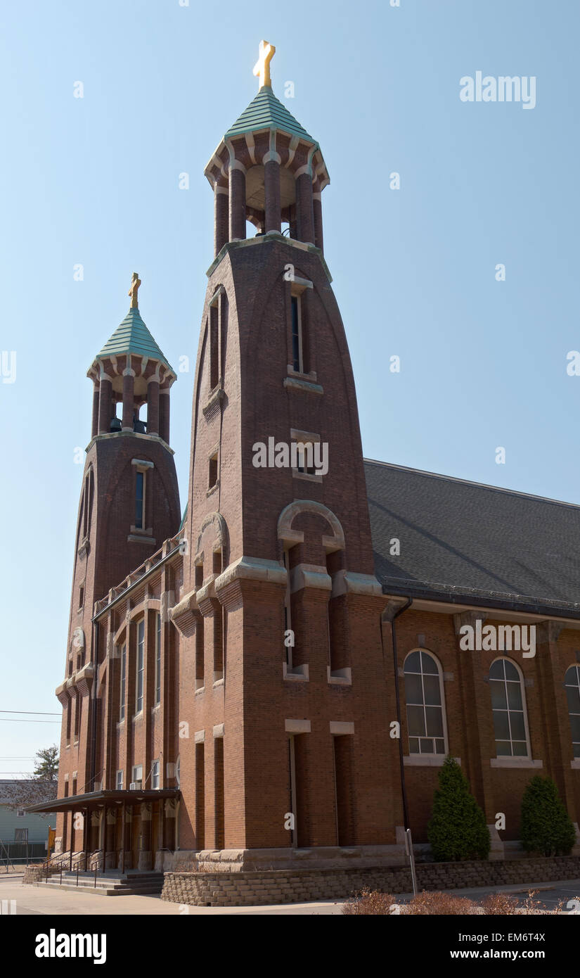 red brick church with bell towers spires and front entry in saint paul ...