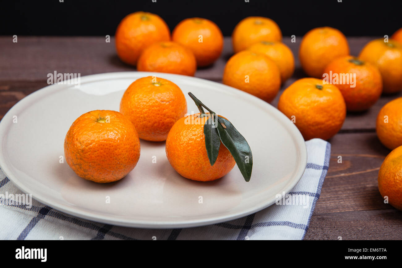 Three tangerines with leaves hi-res stock photography and images - Alamy