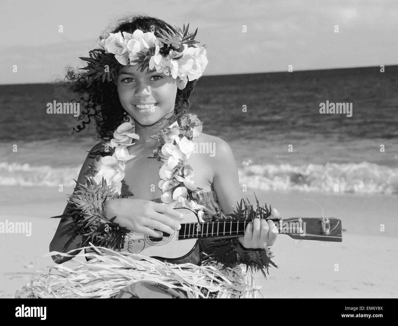 Hula girl ukulele grass skirt hi-res stock photography and images - Alamy