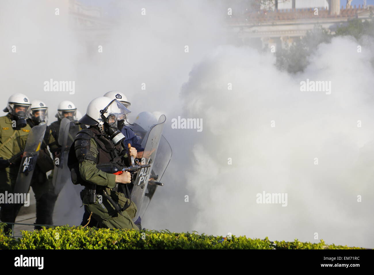 Athens, Greece. 16th Apr, 2015. Riot police officers move towards a ...