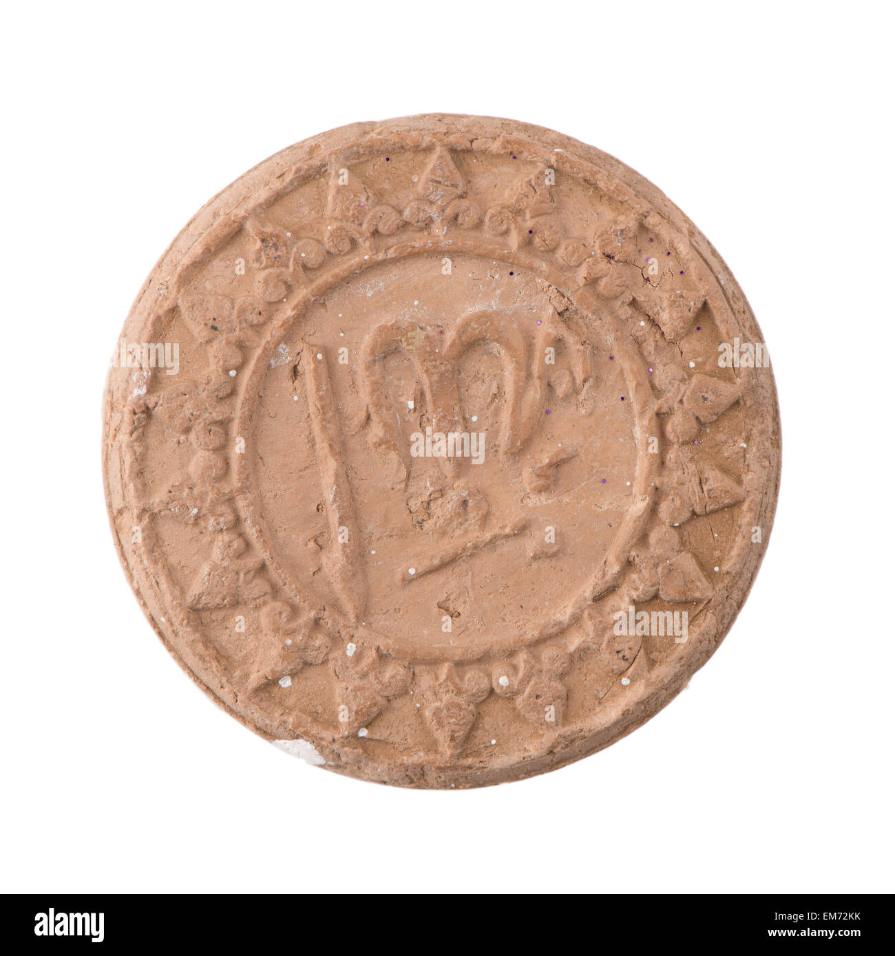 Antique ancient ceramic replica of a coin from Turkey isolated on white ...