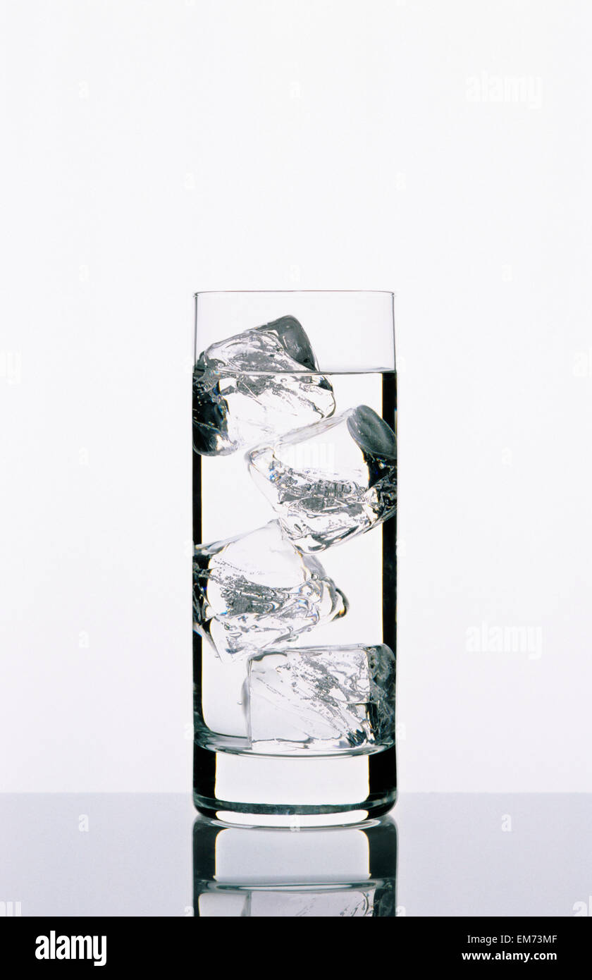 Tall Clear Glass Filled With Water And Ice Cubes Stock Photo - Alamy