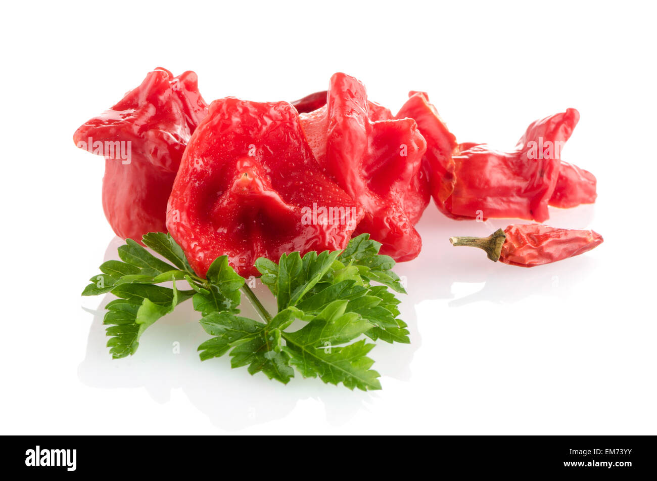 Red peppers closeup on white background Stock Photo - Alamy